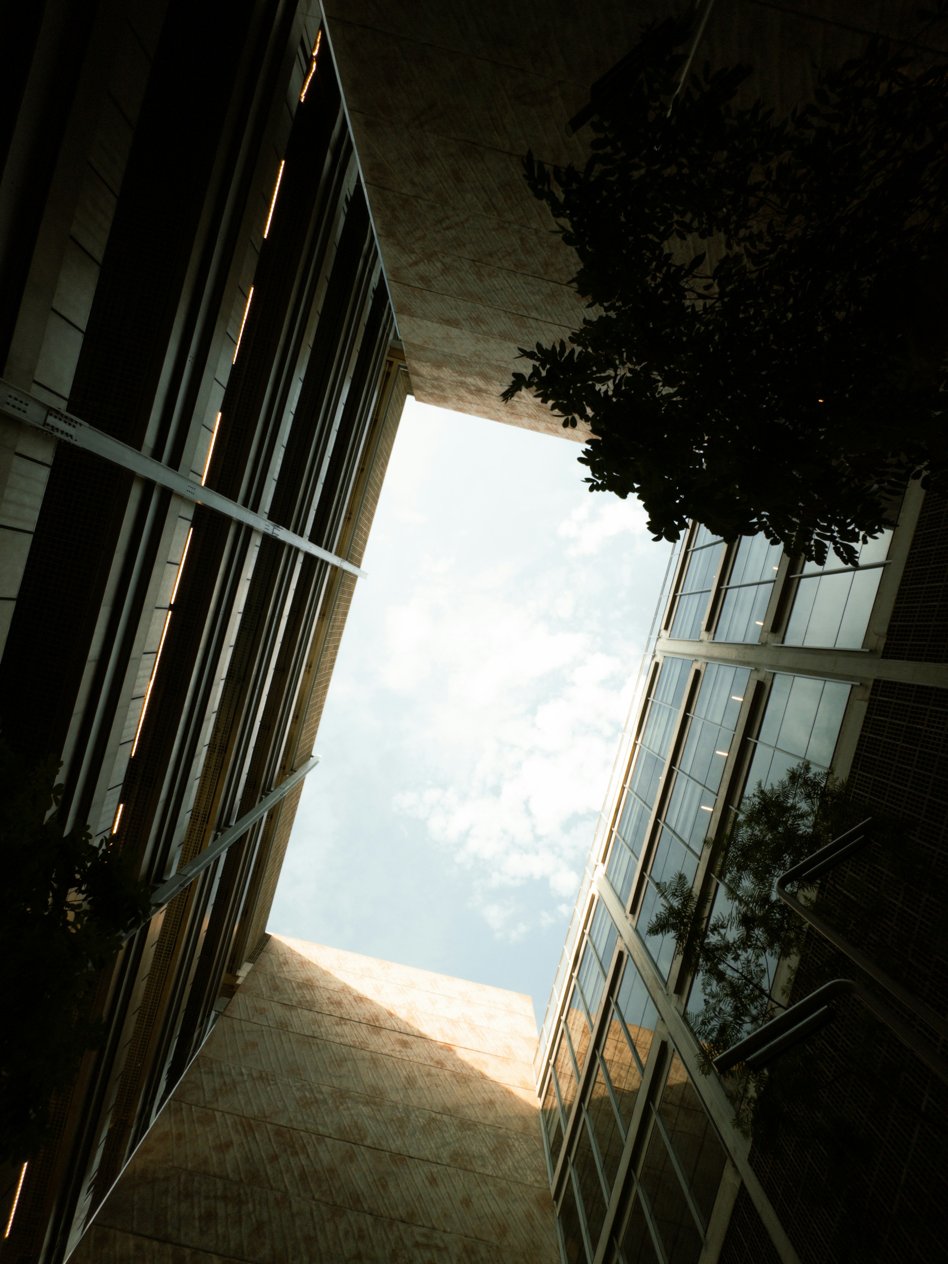 Constricted Skyward: A Vertical Atrium Mirage