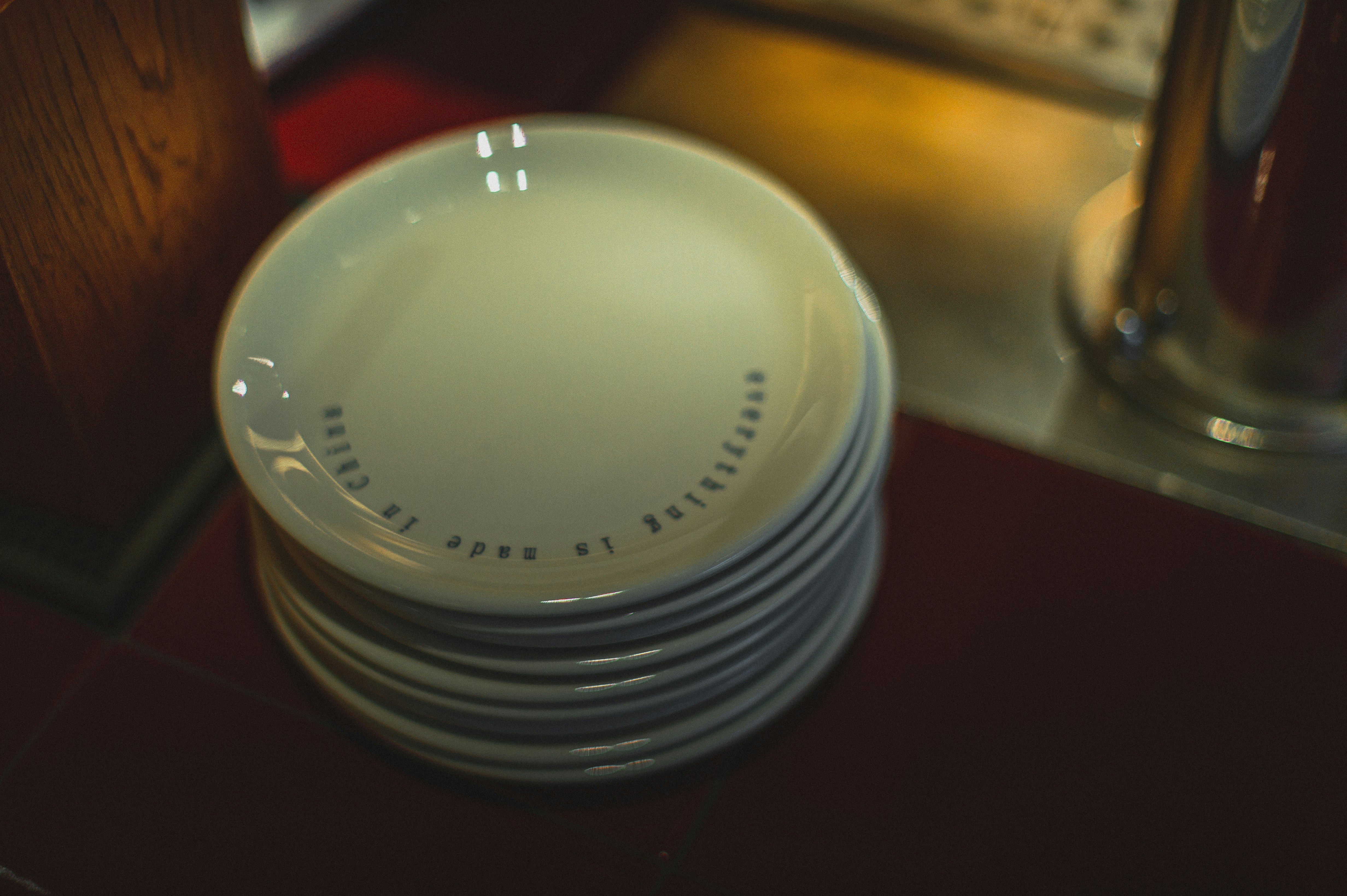 Ceramic Stack Beneath Warm Vintage Lighting