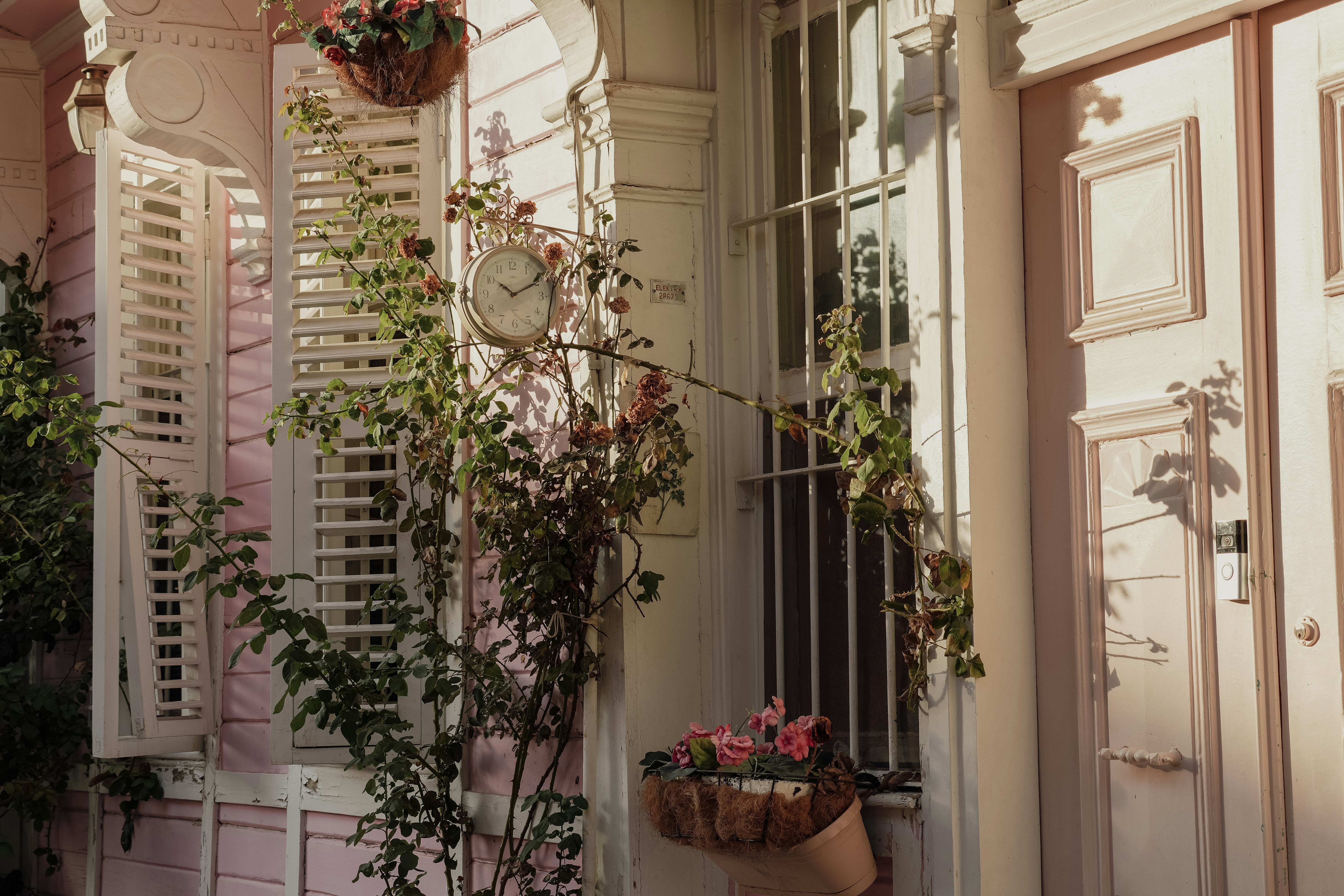 Pastel Porch with Winding Rose Arches