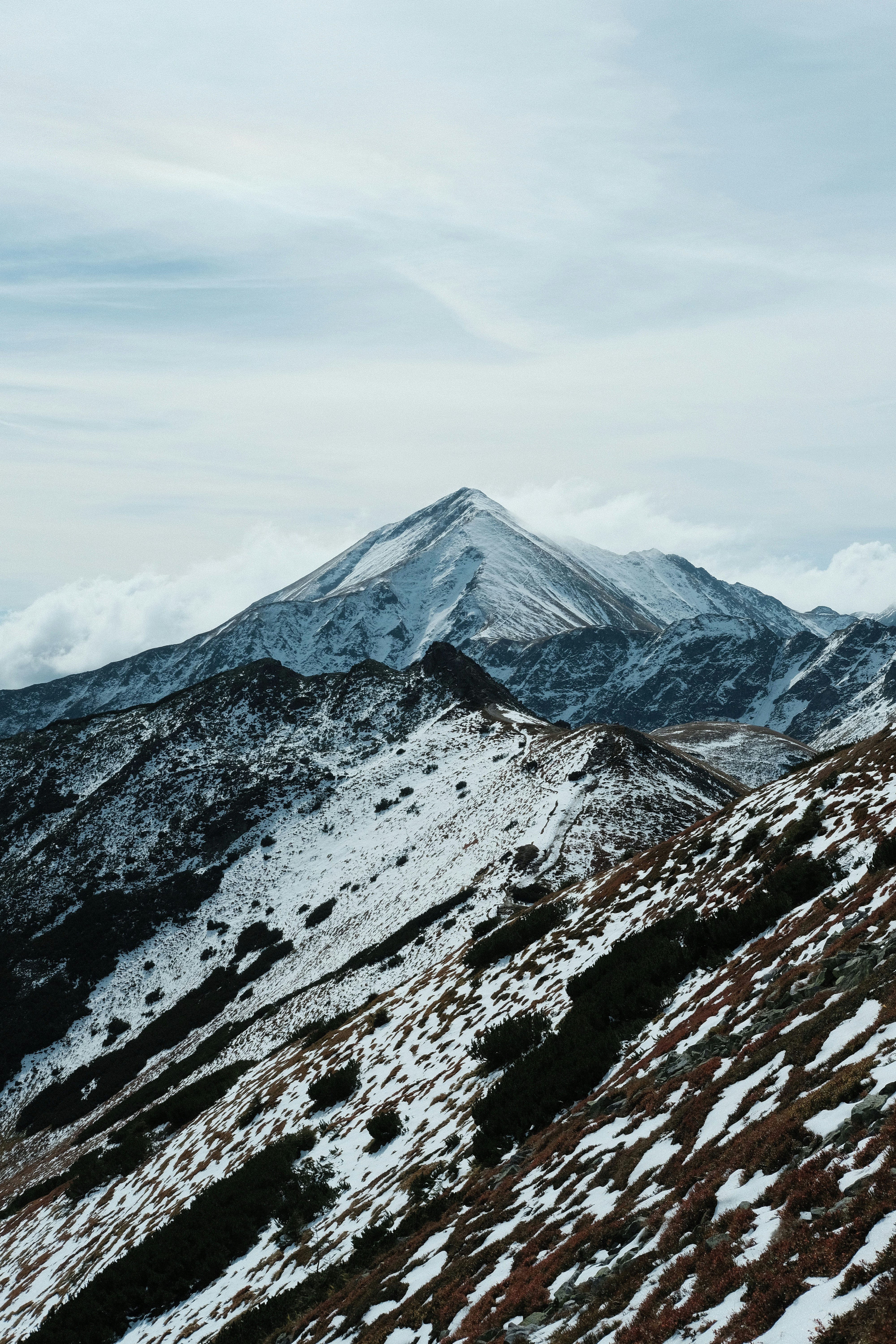 Snow-kissed Peak Piercing the Sky