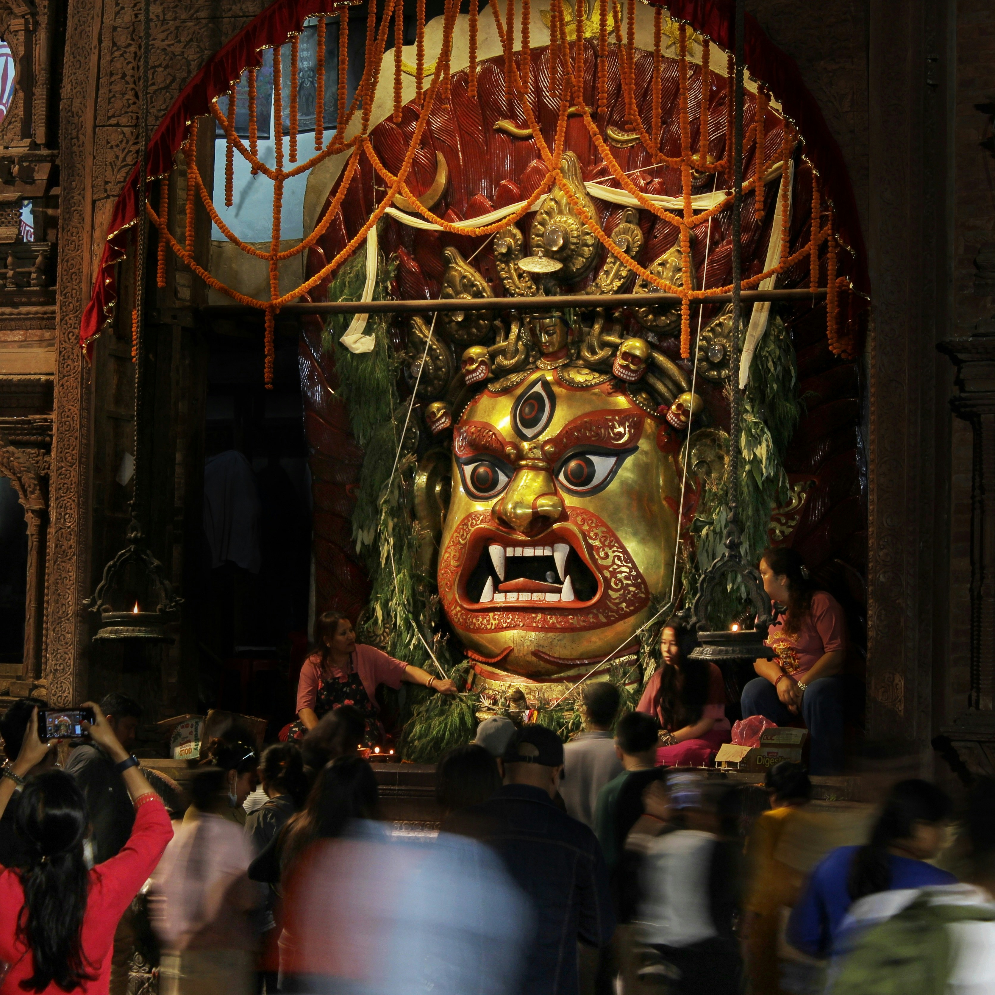 Golden Mask Temple Shrine: A Fiery Demigod Gazes Over the Crowd
