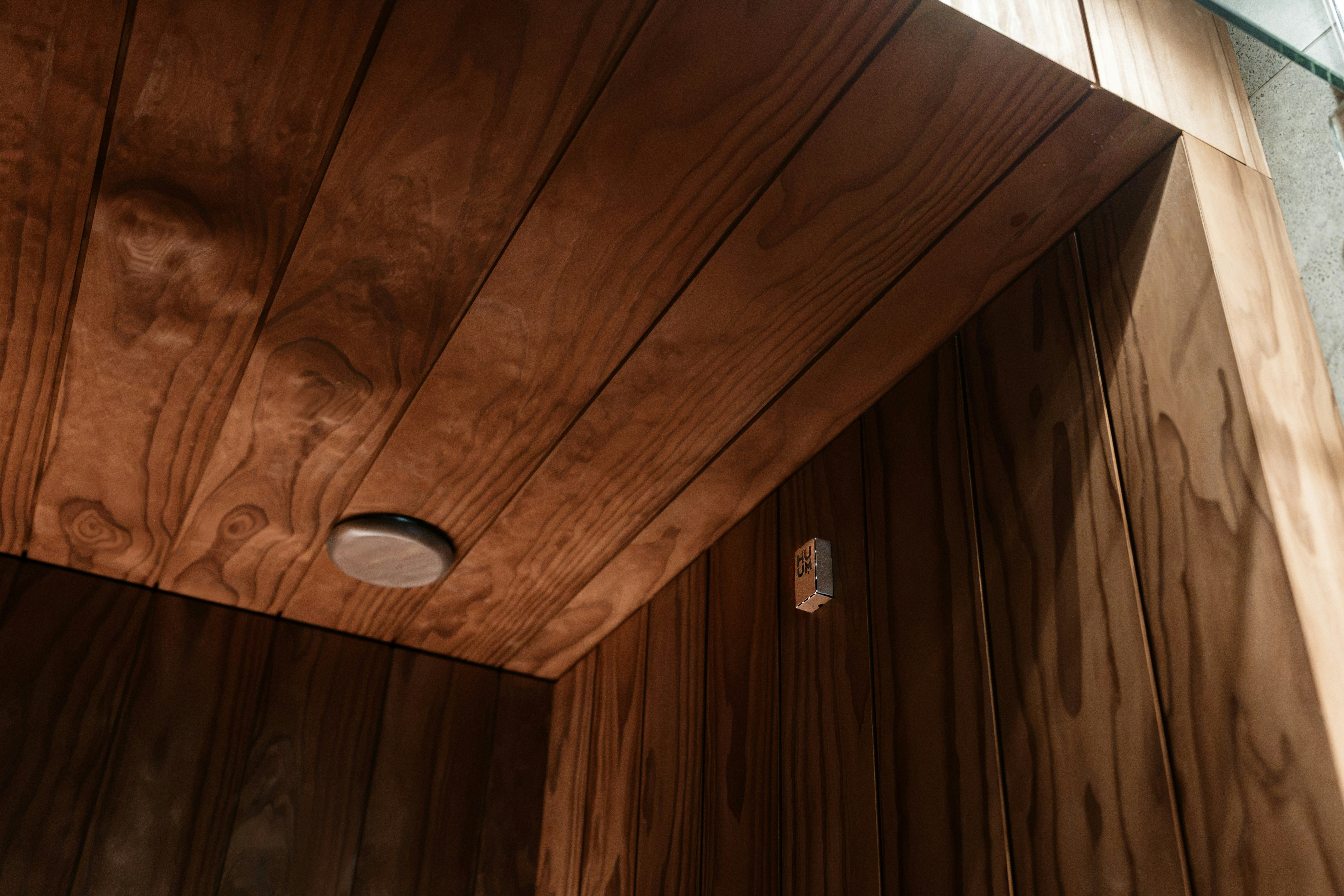 Cedar Lines and Hidden Ceiling Light in Warm-wood Nook