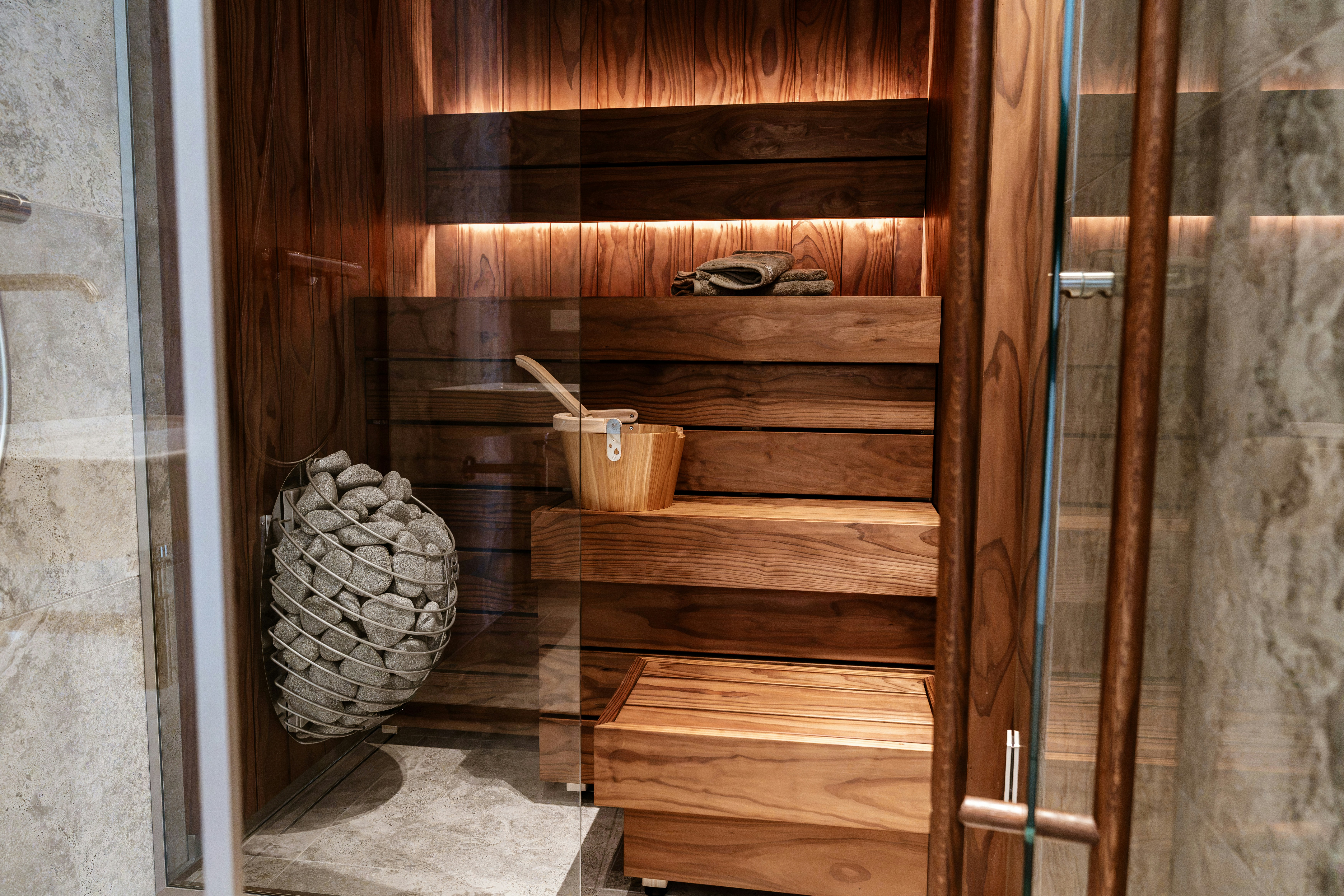 Warm Lines and Wooden Calm: Sauna Steps in Dim Lighting