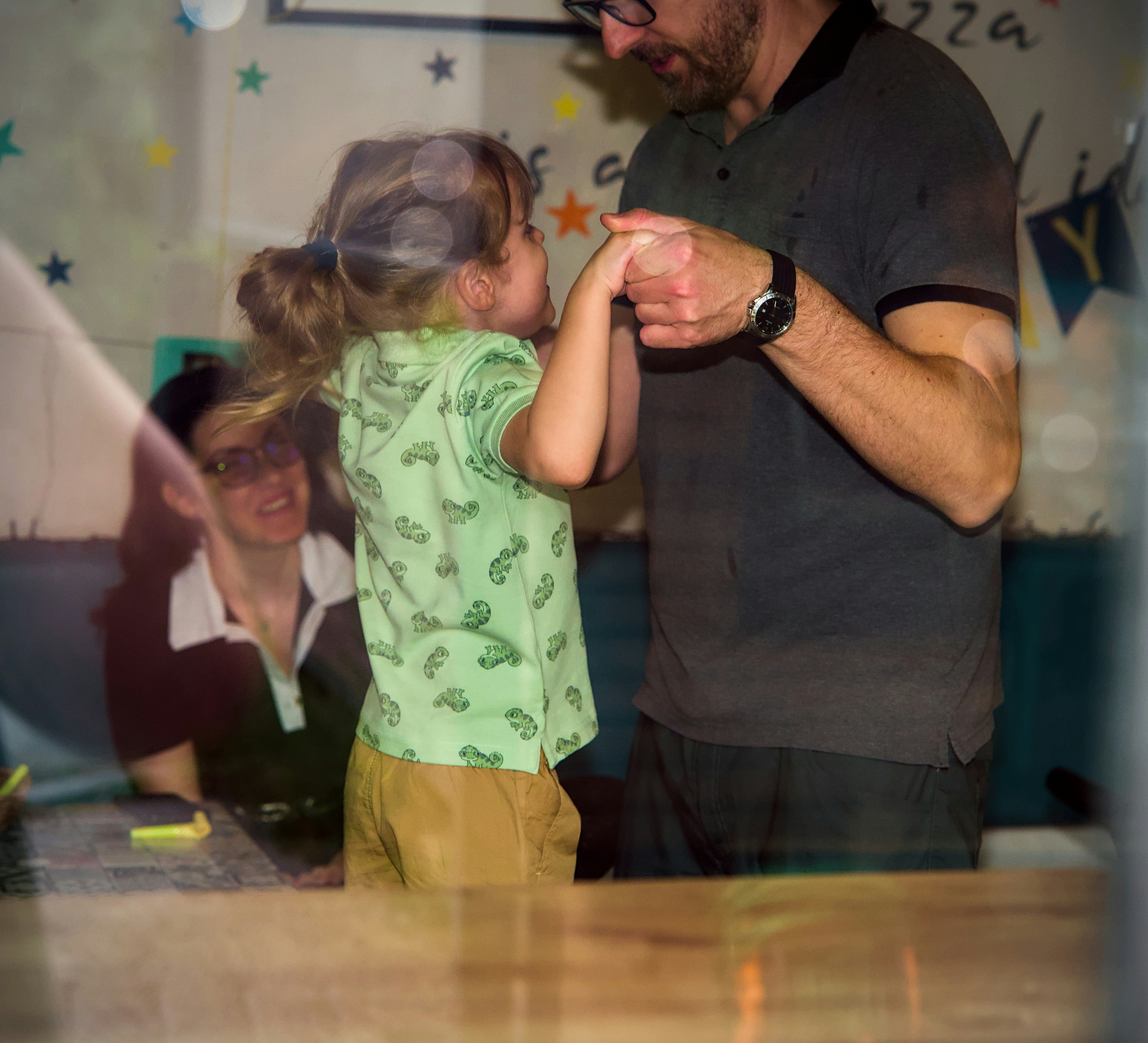 Dance of Trust: a Father and Child in a Motion-Blur Moment