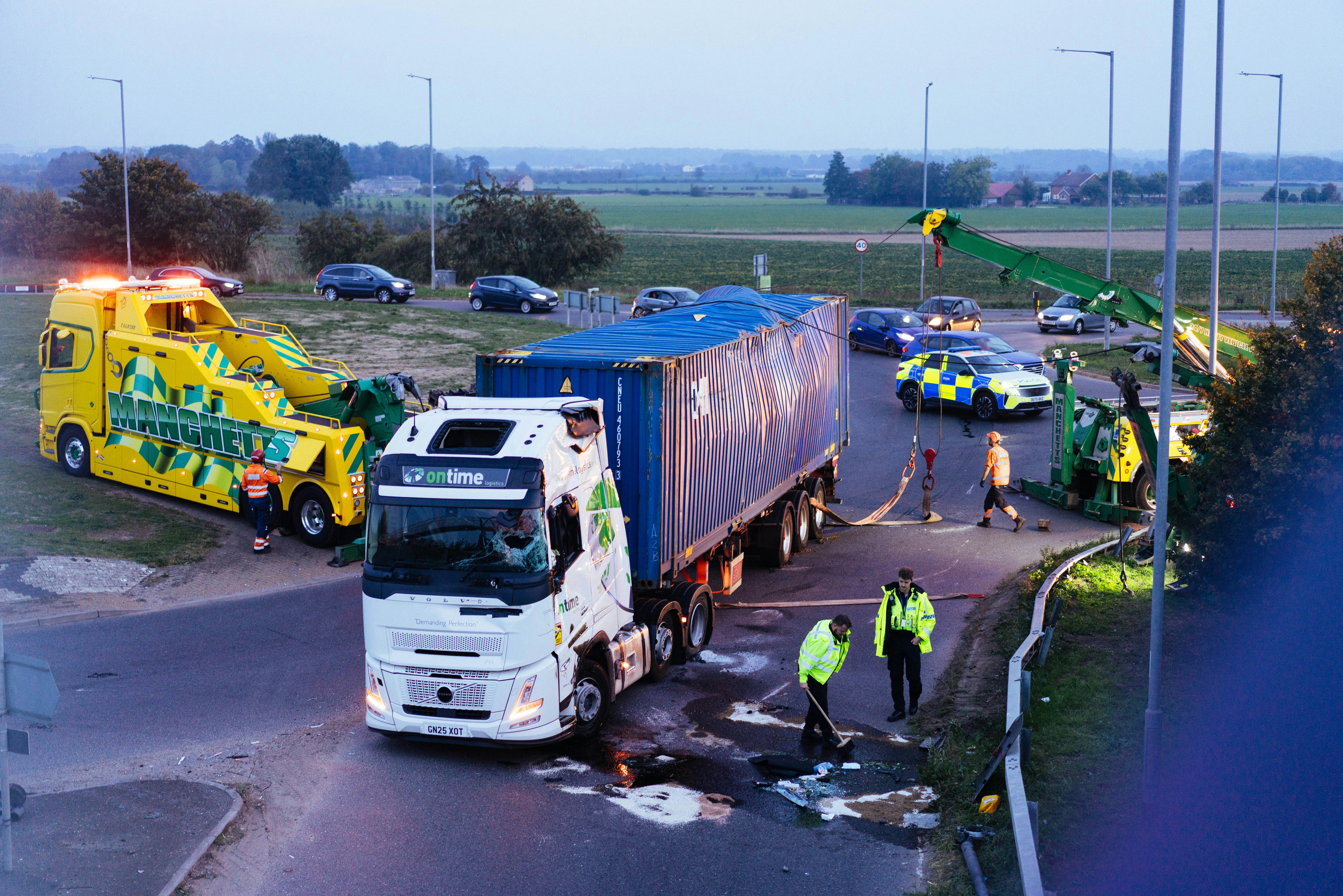 Tow Trucks, Hazard Lights, and a Crash-Side Standstill