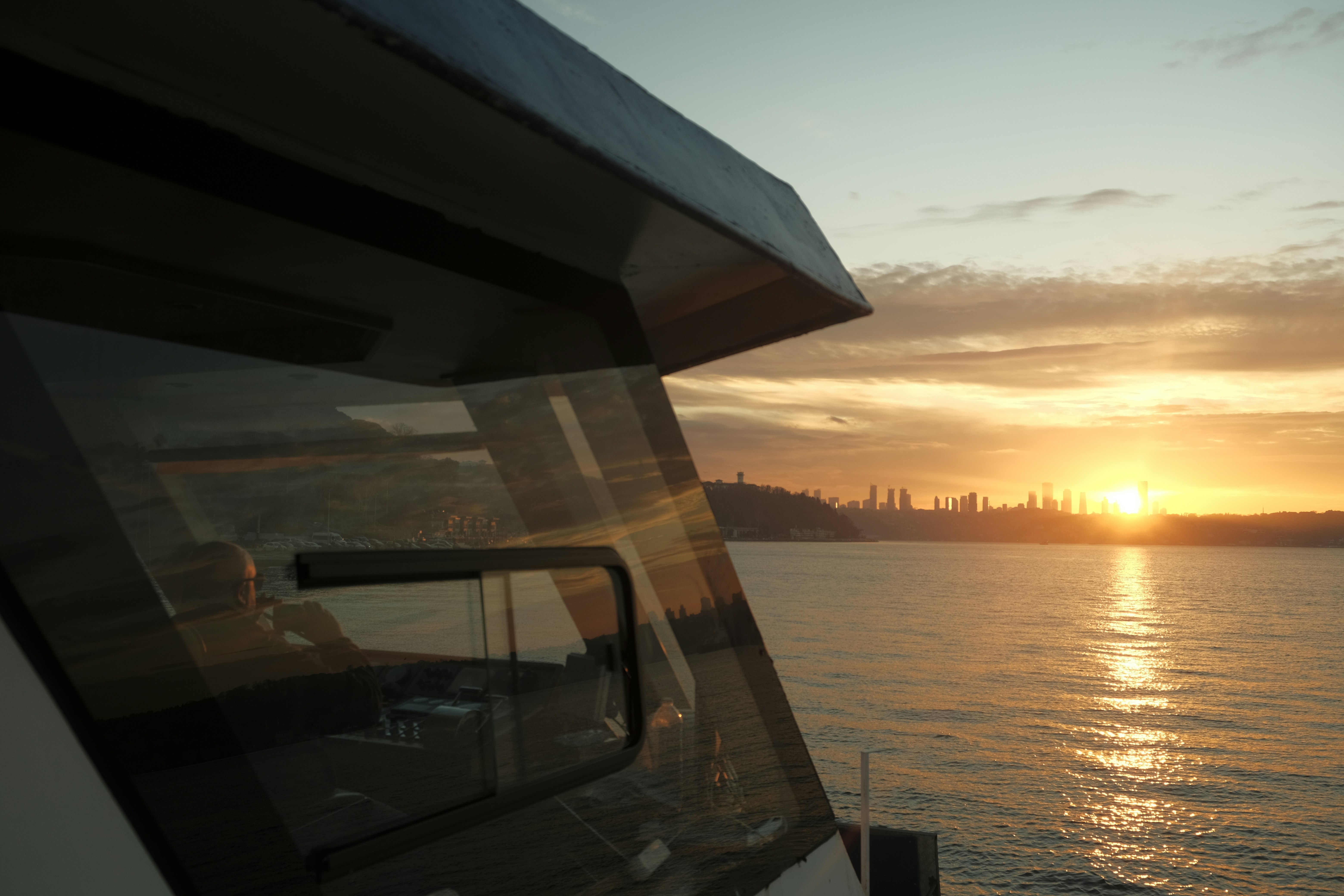 Sunlit Window on a Quiet Harbor Crossing