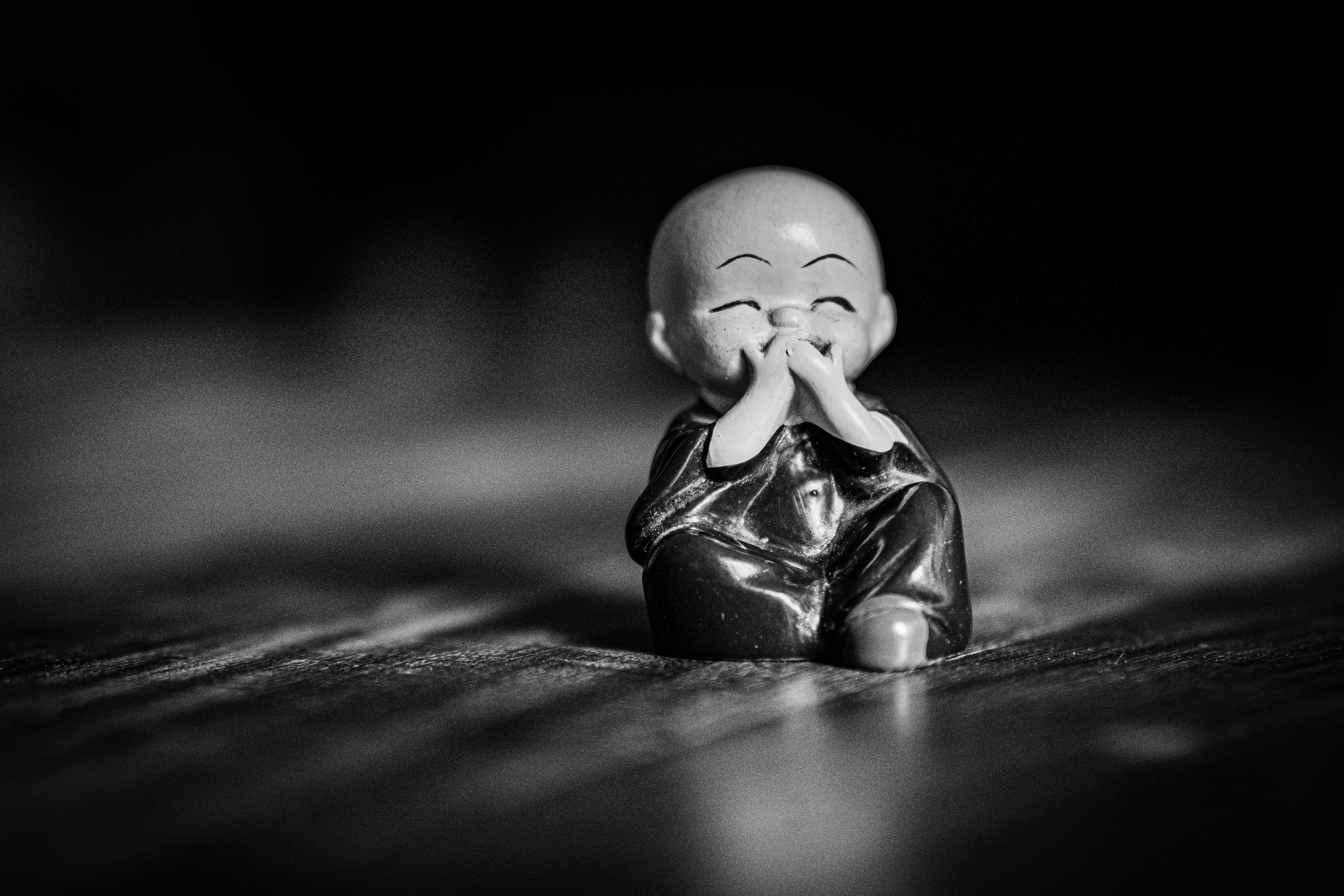 Whispered Joy: A Tiny Buddha Found in Quiet Shadow