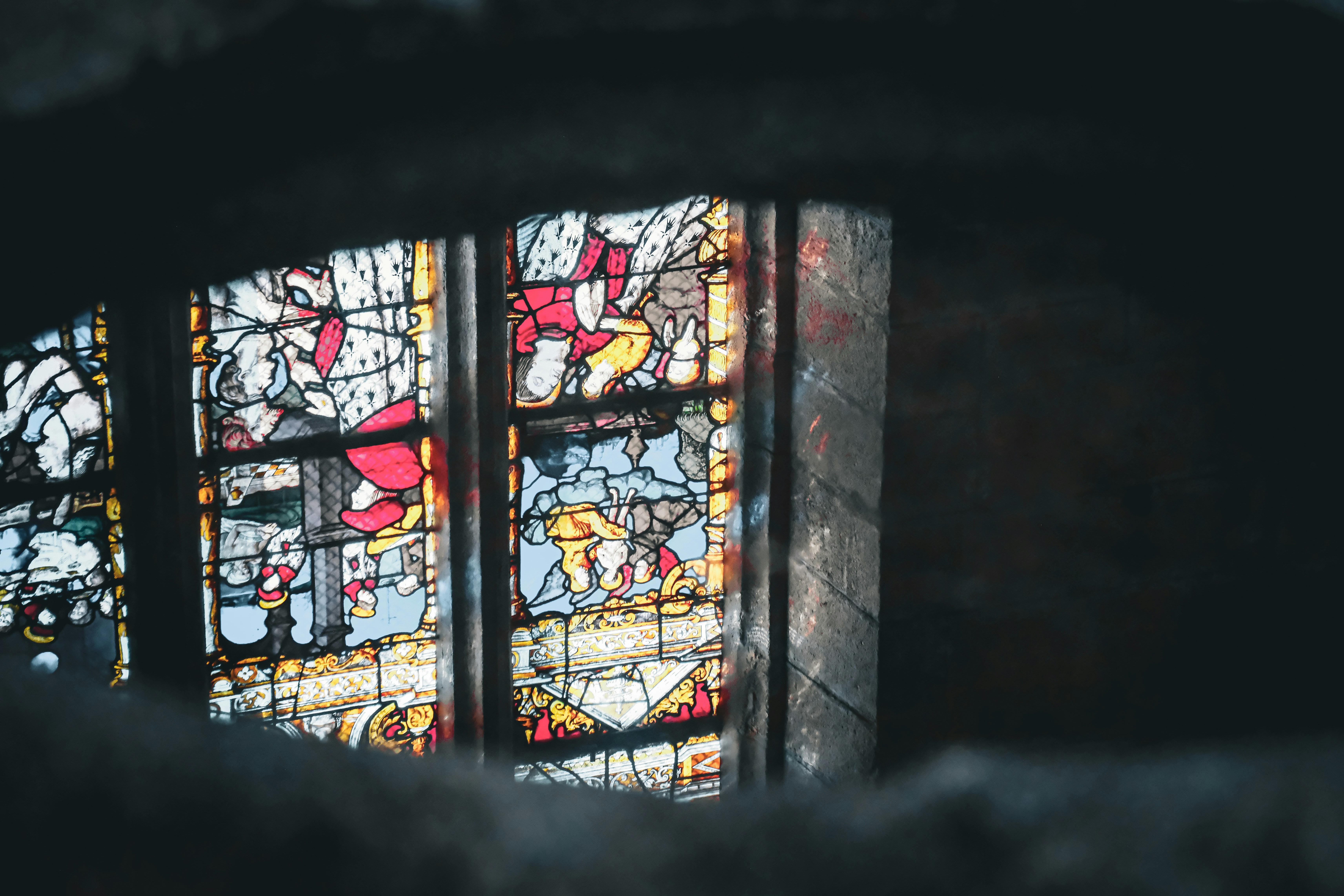 Stained Glass Fragments Through a Cracking Veil