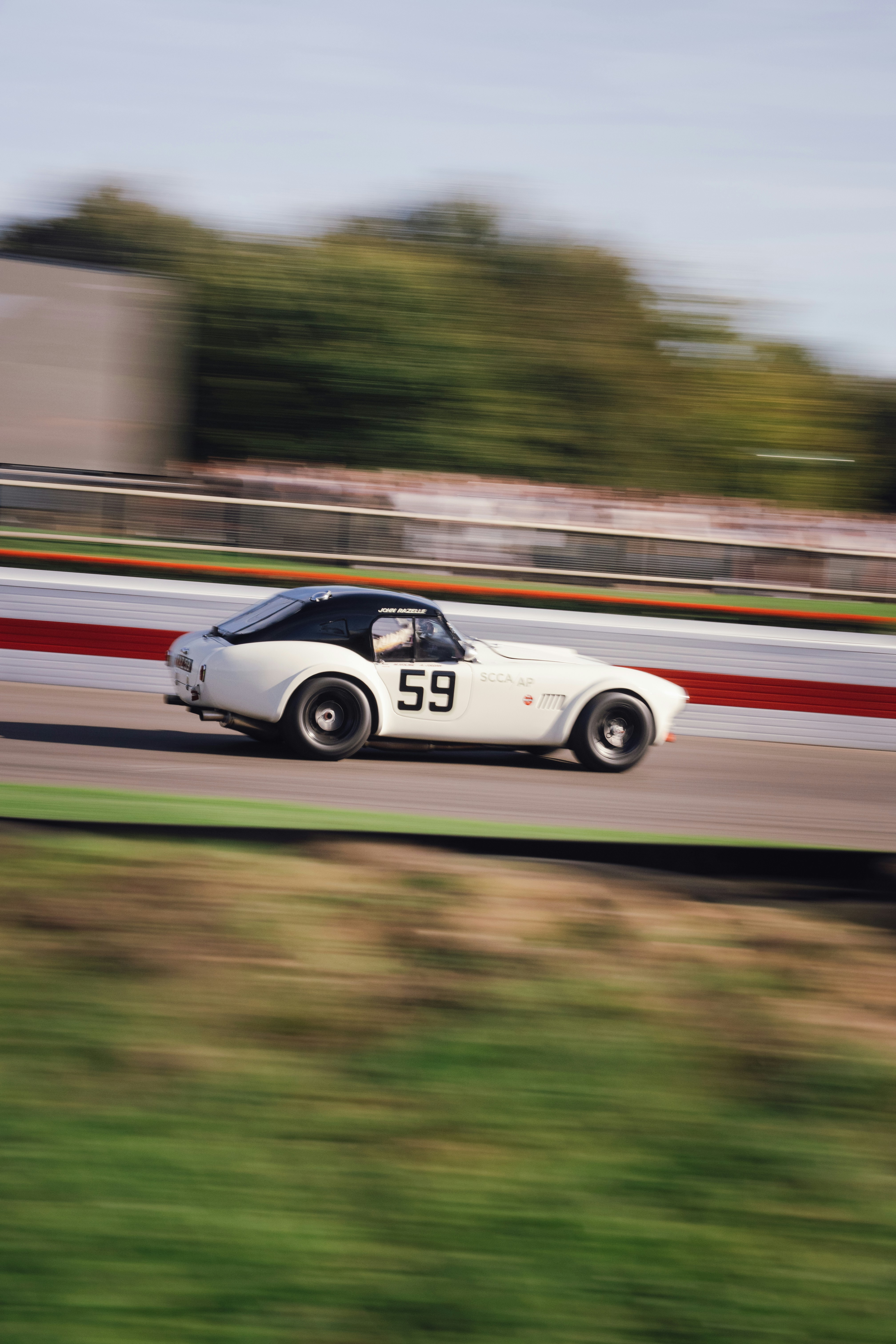 White Vintage Racer in a Blur of Speed