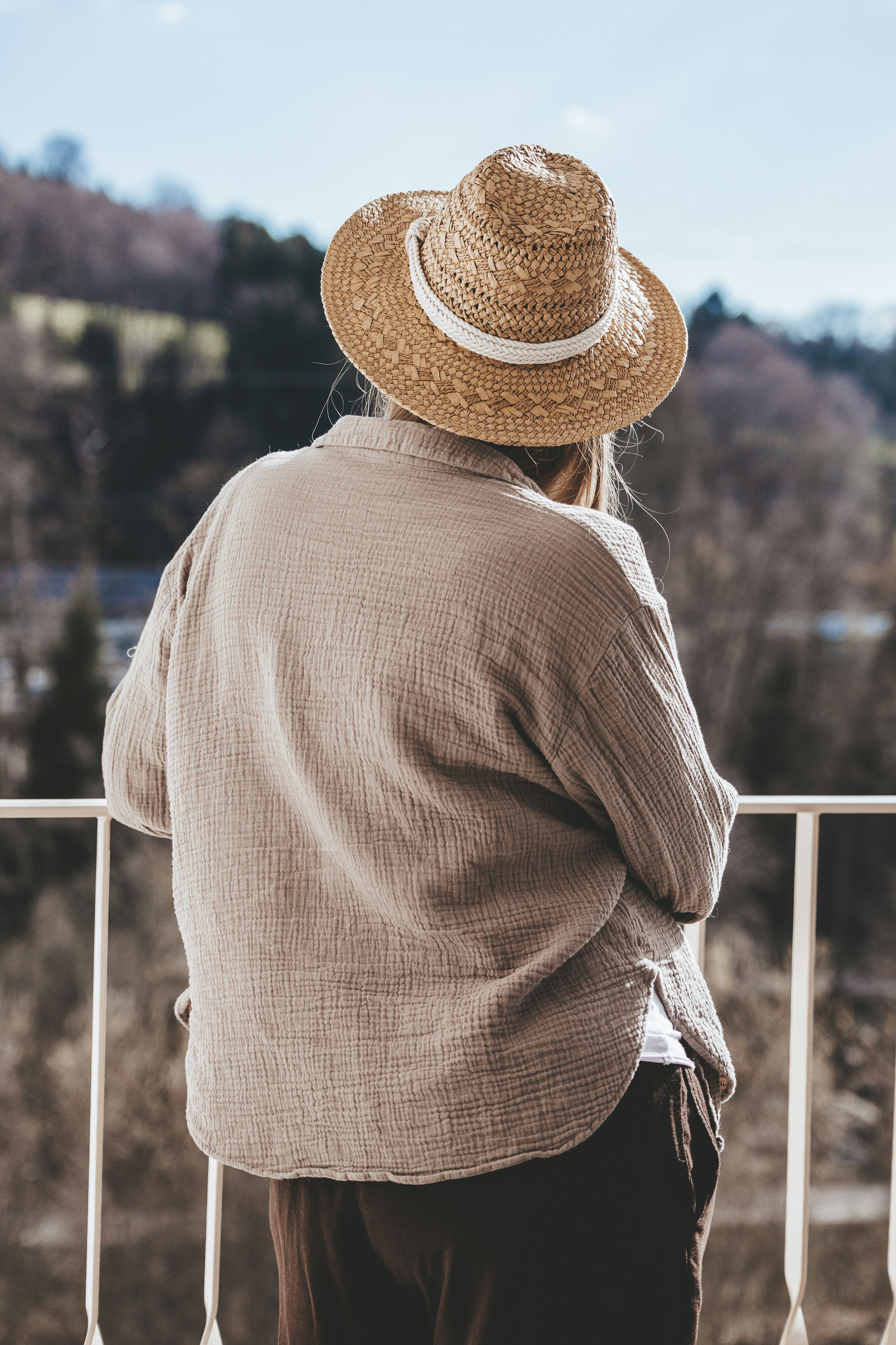 Sunlit Studio: A Portrait from Behind in Neutral Linen Shifts