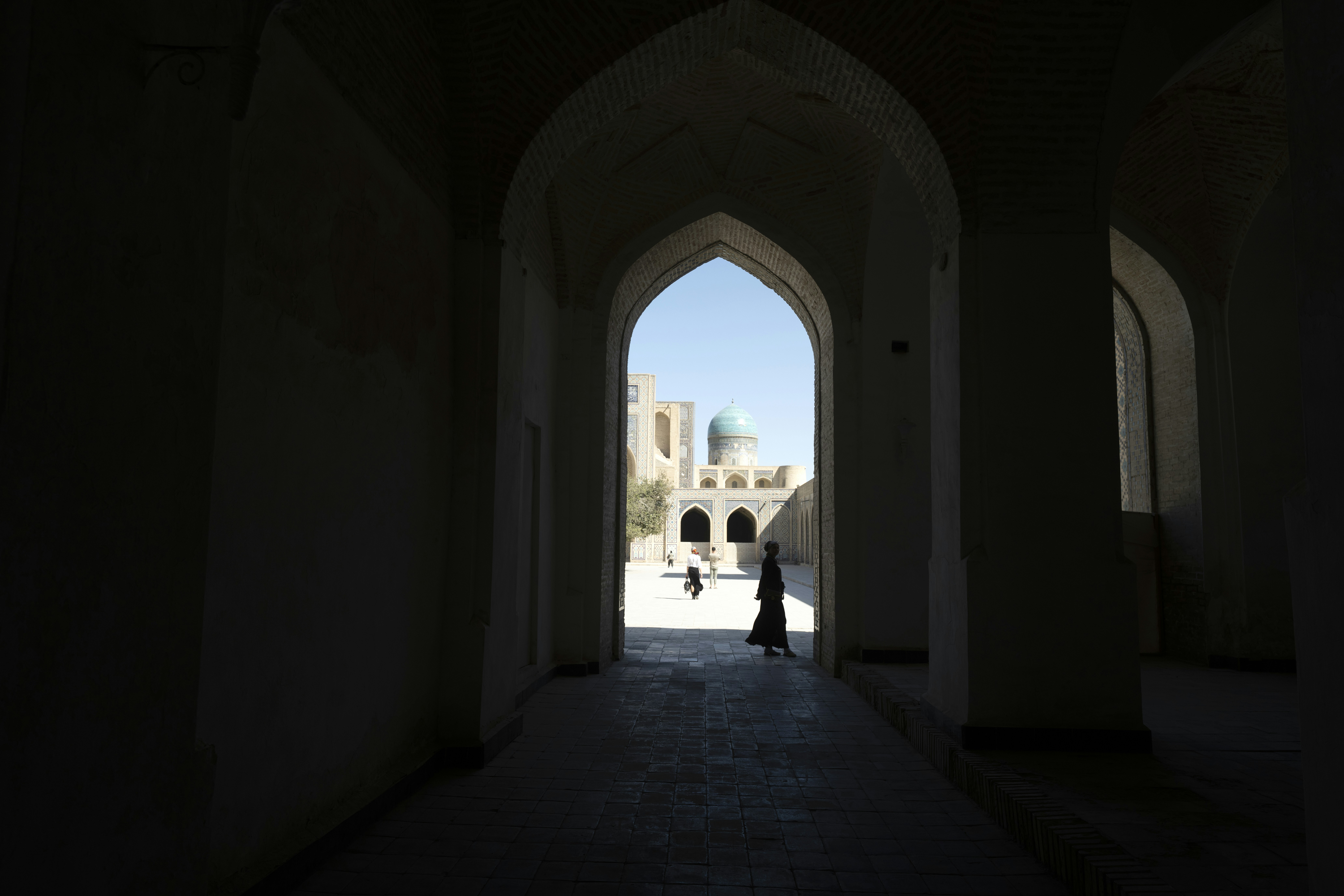 Light at the Archway: A Quiet Corridor to the Courtyard