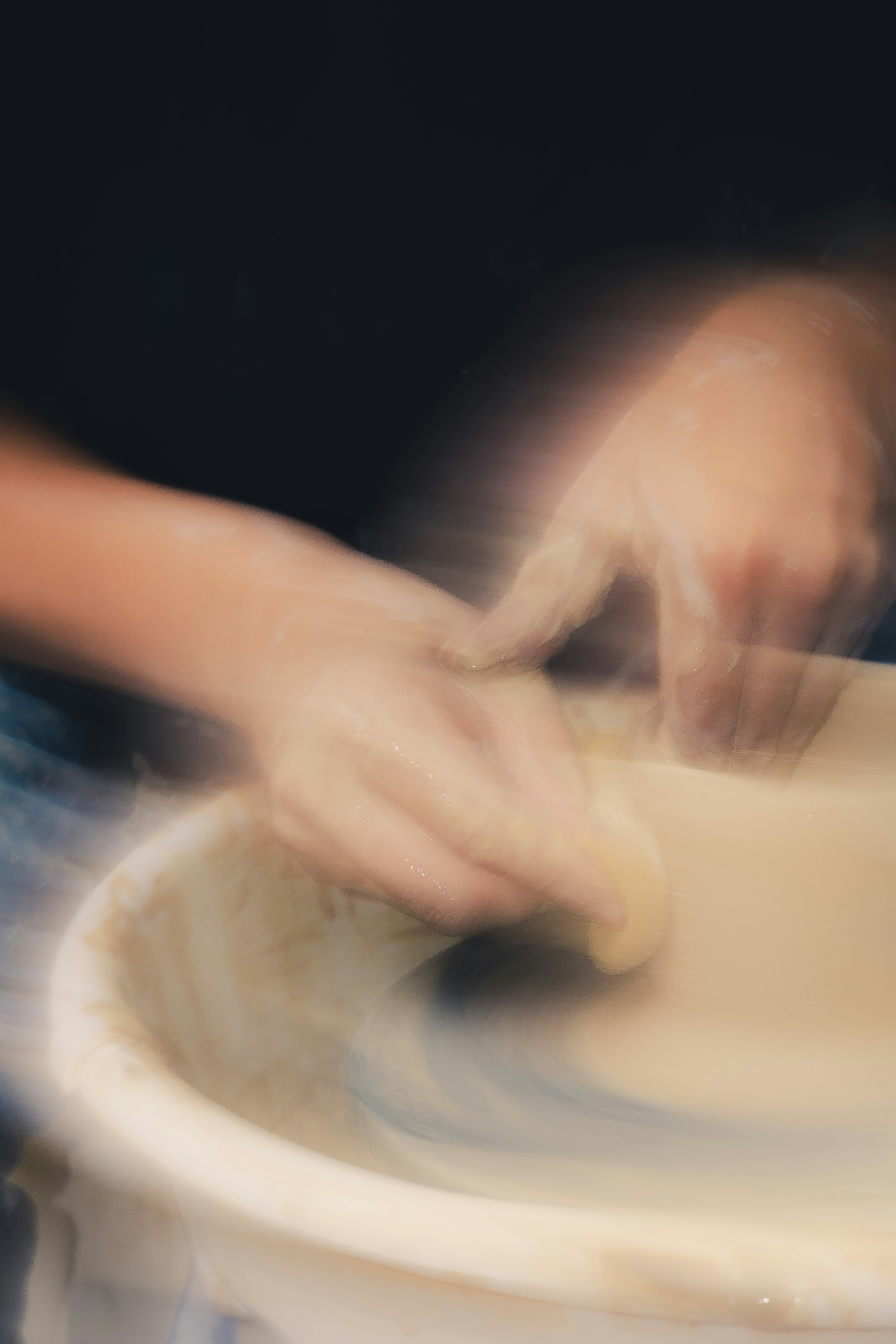 Blurry Hands at the Pottery Wheel: Motion in Clay