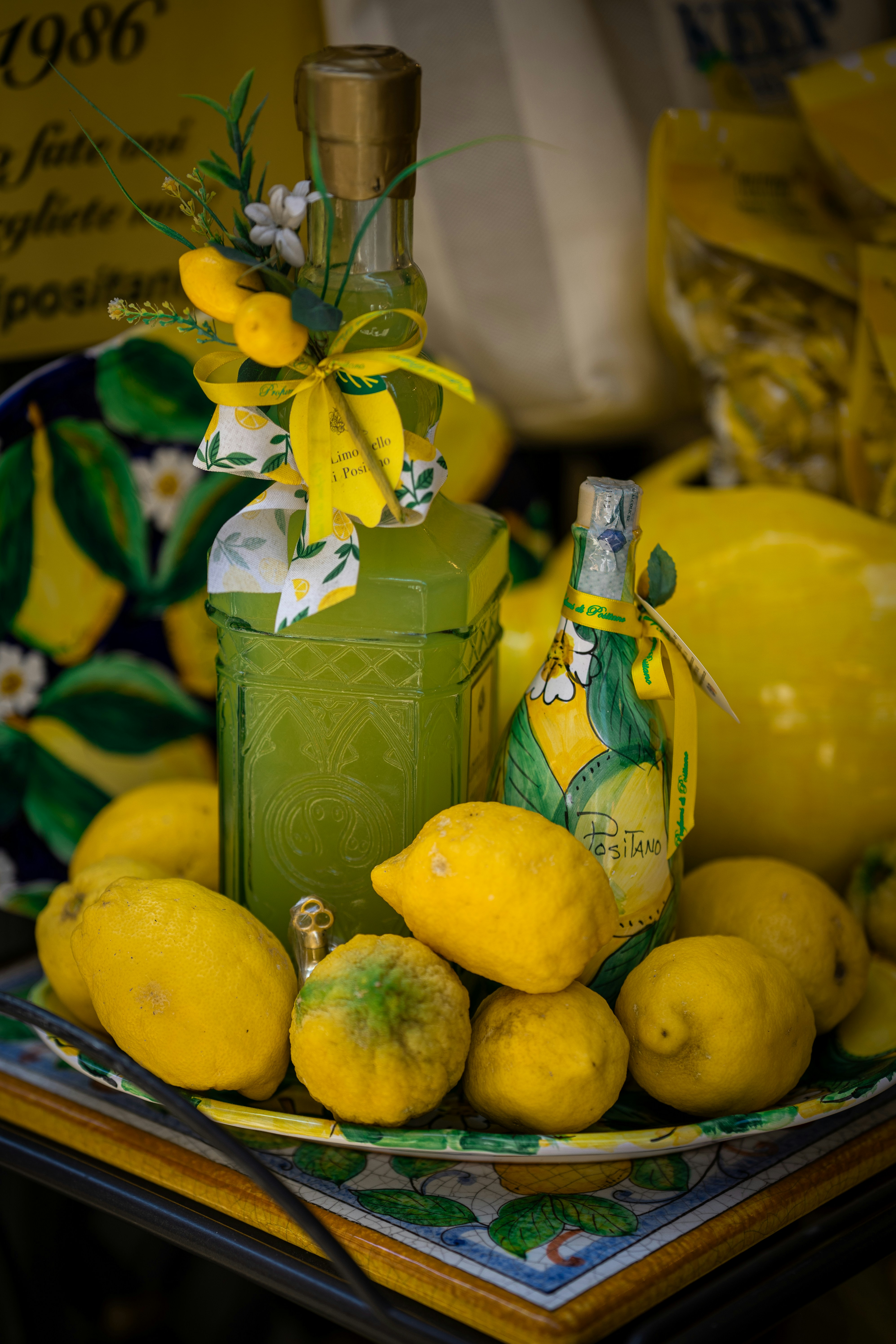 Zesty Bottles and Golden Lemons: A Still Life of Citrus and Spirits