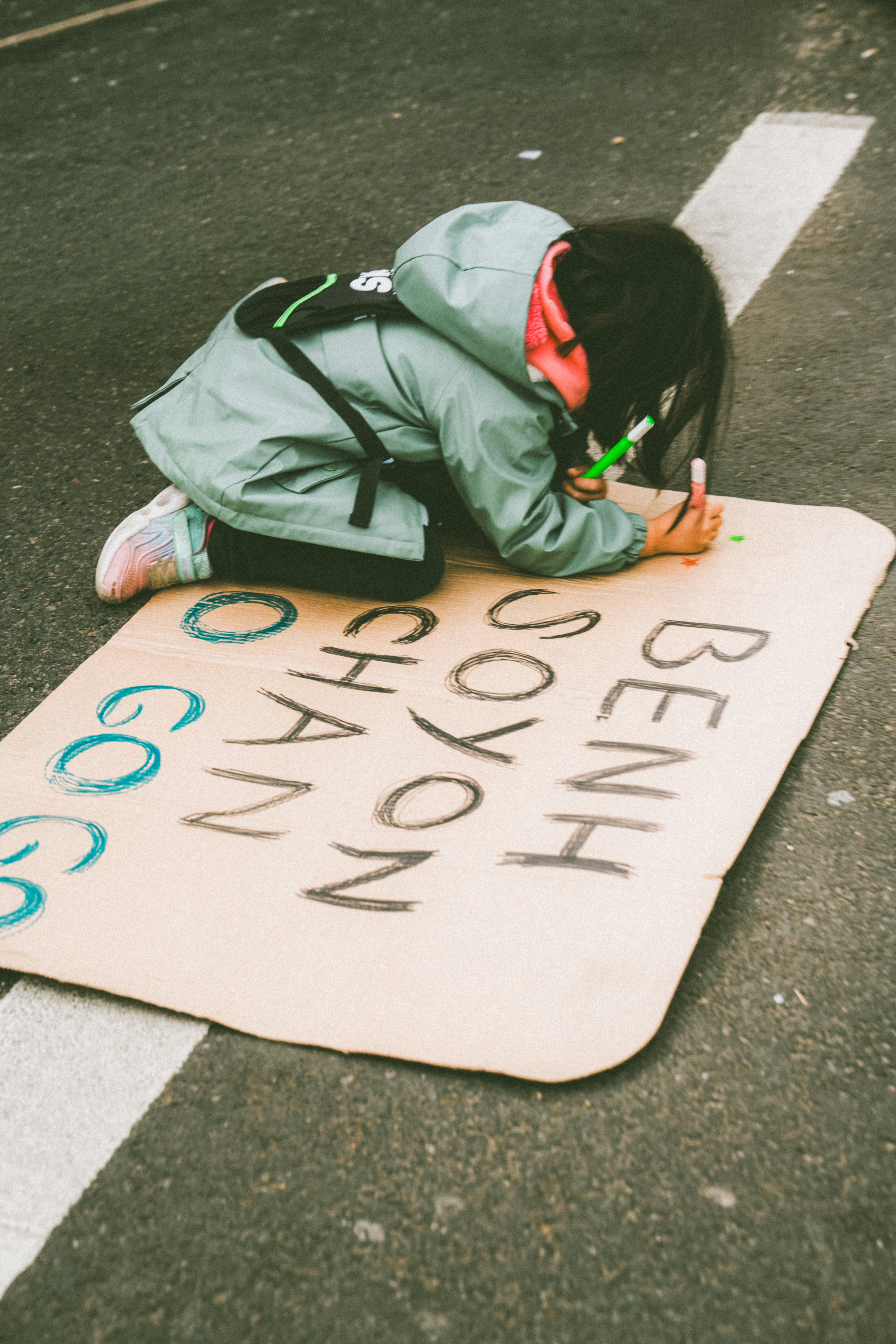 Chalked Message on the Road: A Child’s Honest Petition on Asphalt