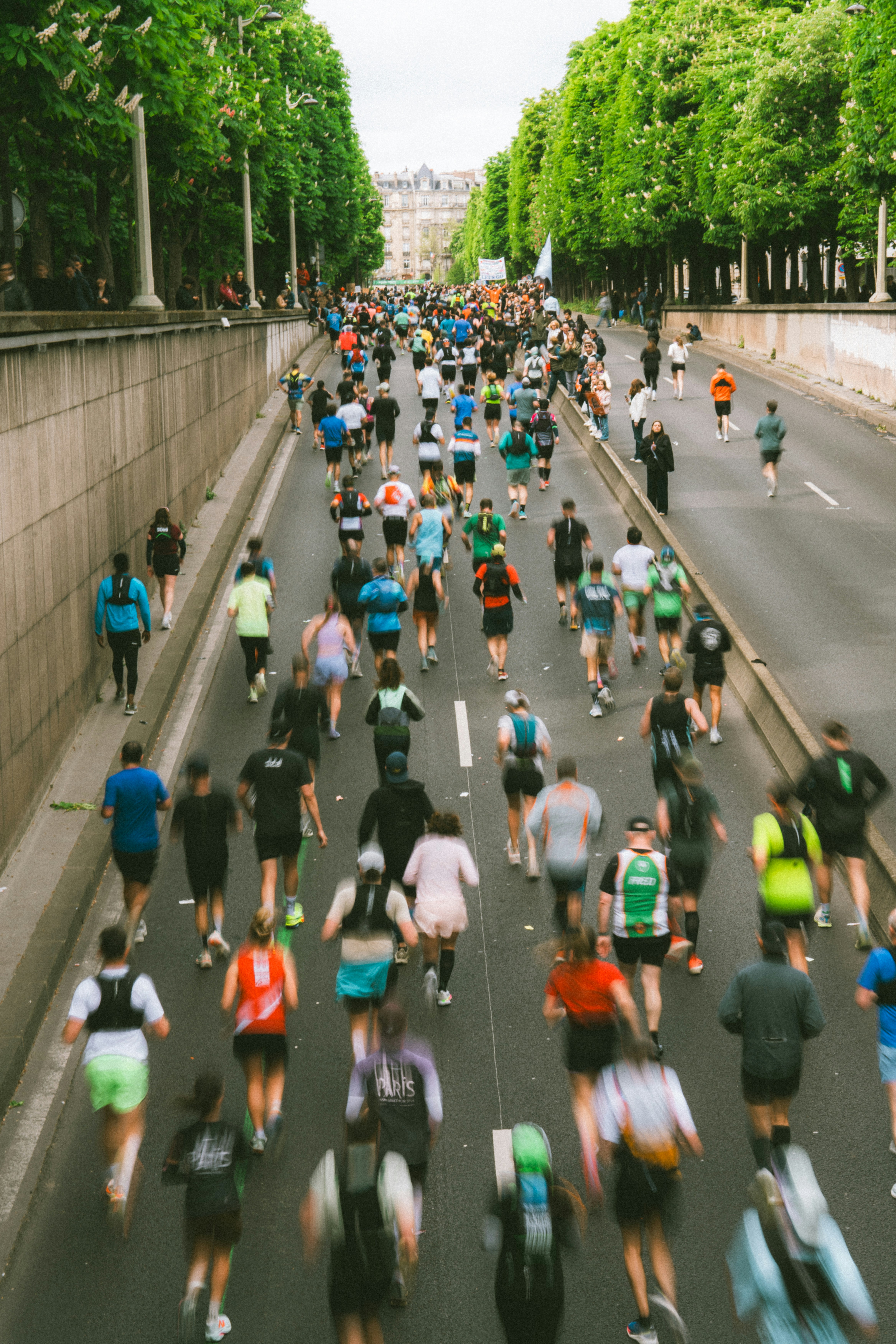 Urban Marathon: A Sea of Runners Converges Toward a Distant Finish
