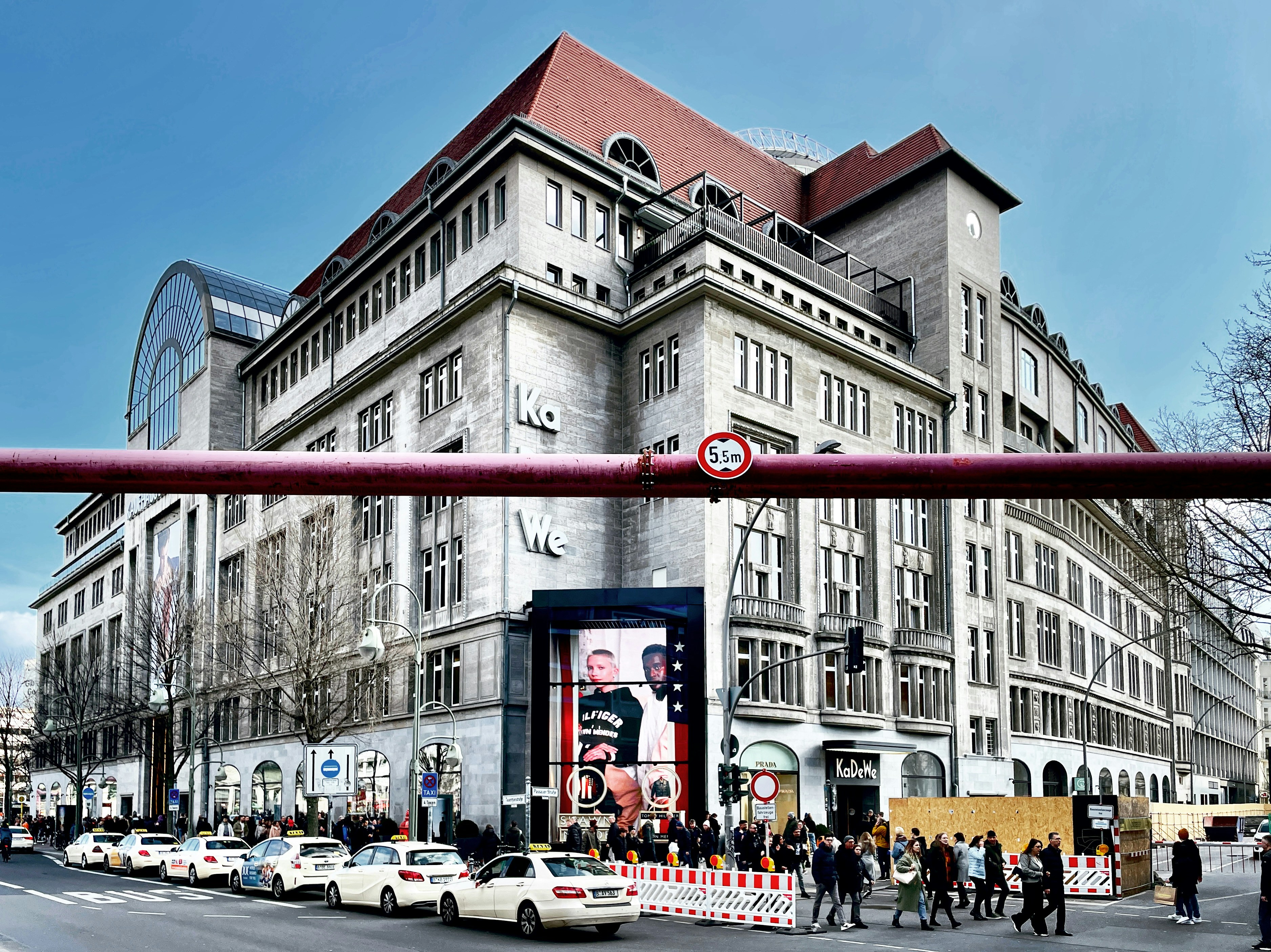 Urban Facade at Dusk: A City Street Framed by a Historic Block