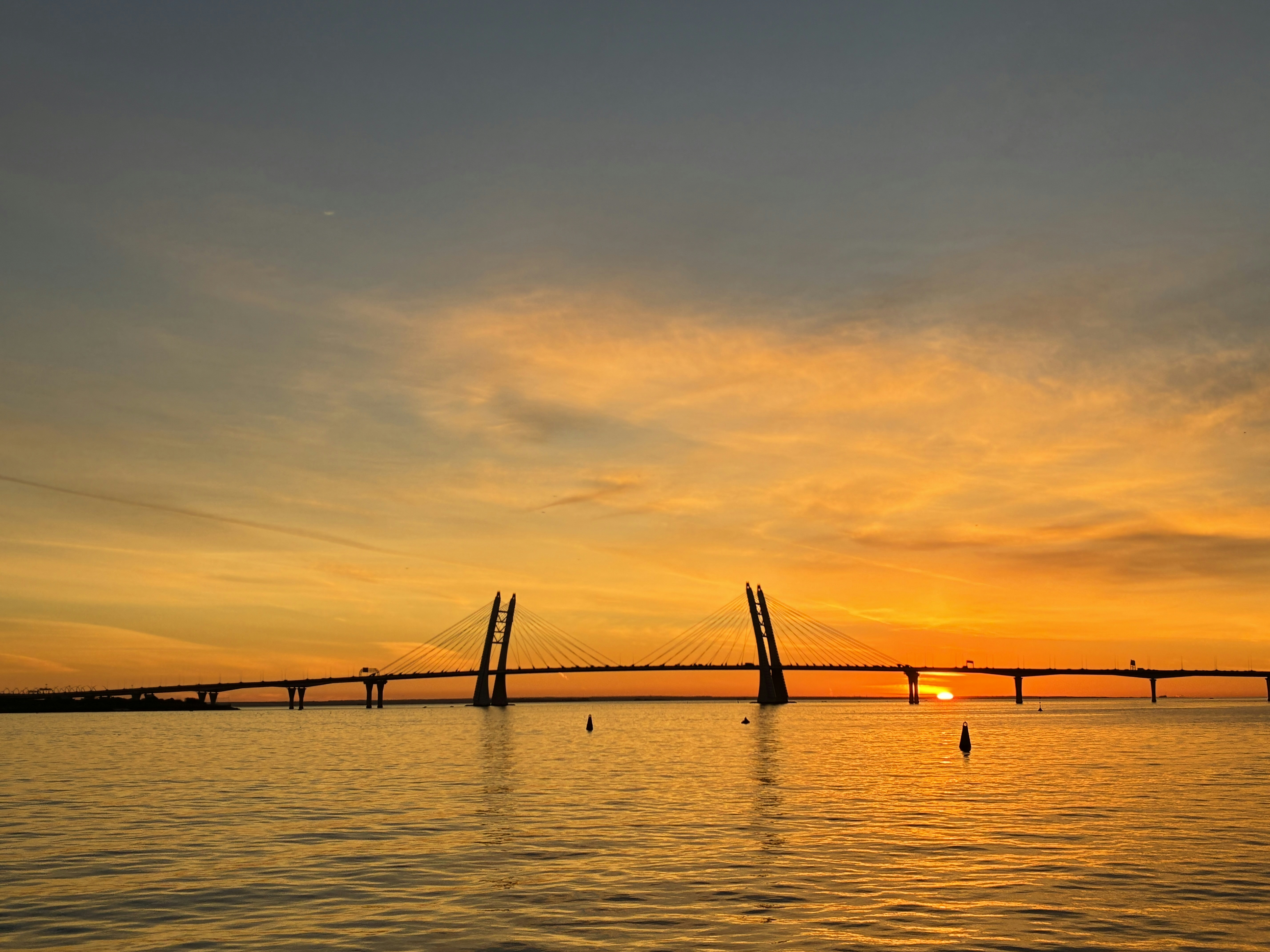 Golden Span: Sunset Over a Modern Bridge