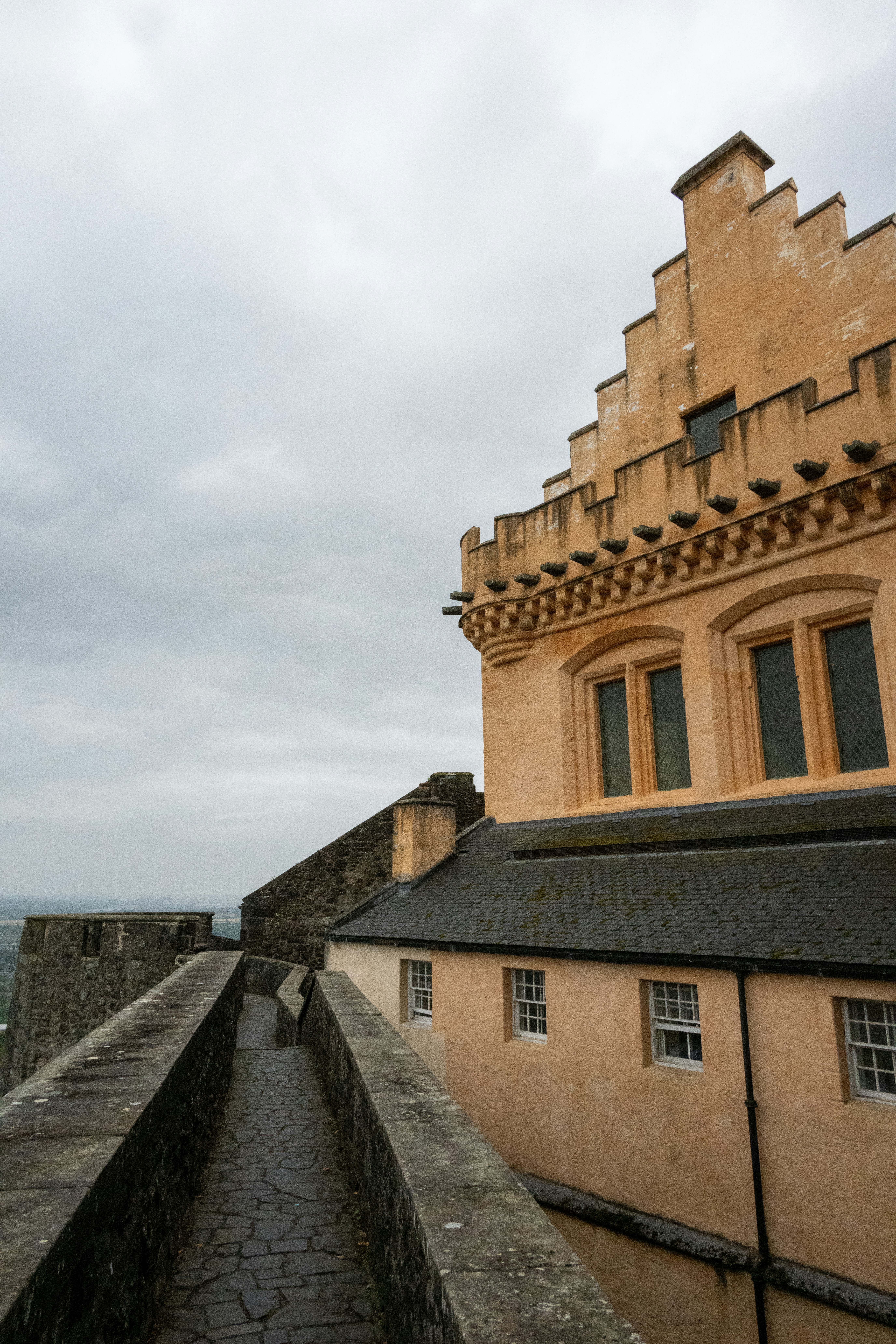 Castle Walkway Under Gray Skies
