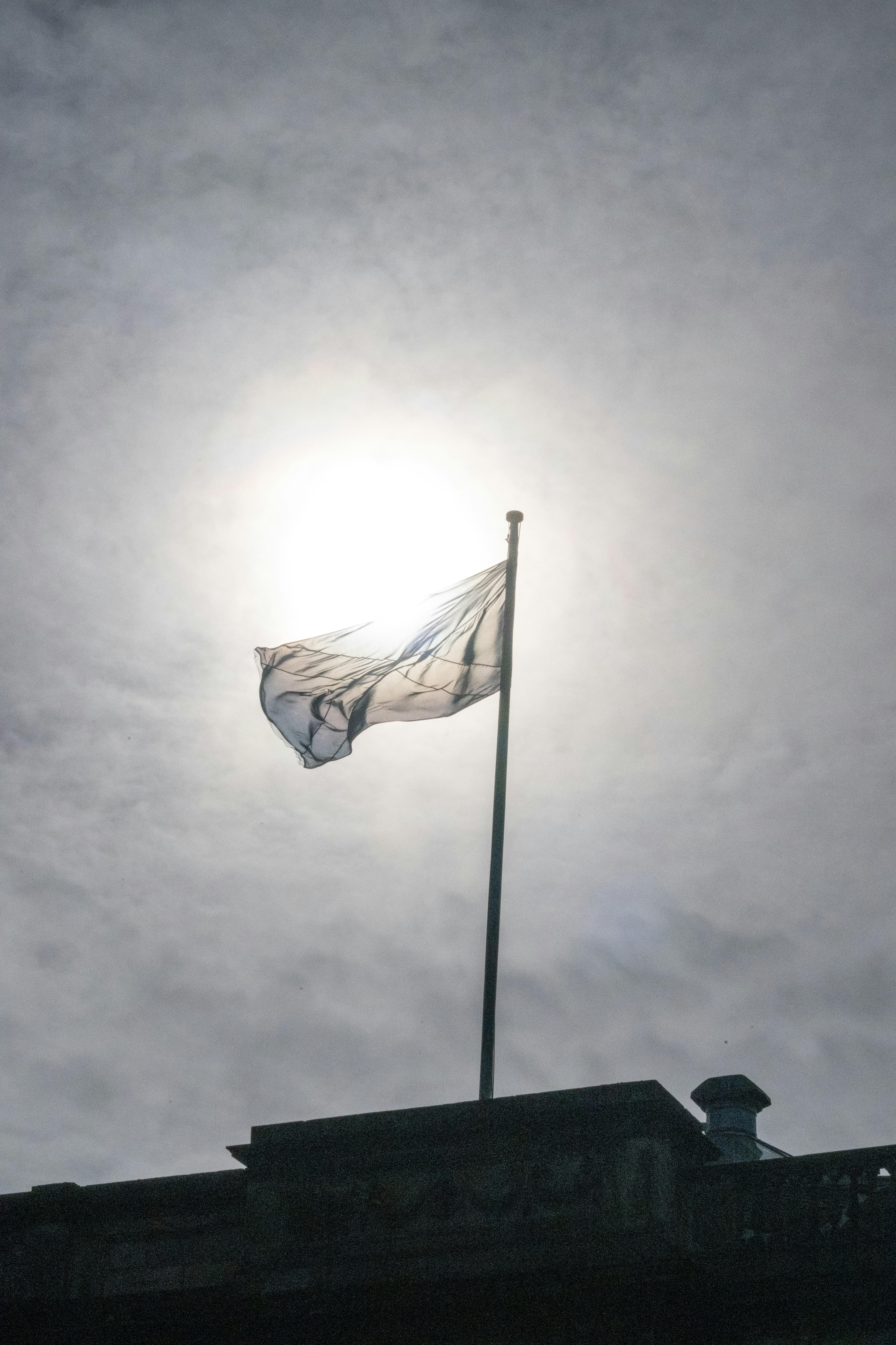 Sunlit Flag at the Summit