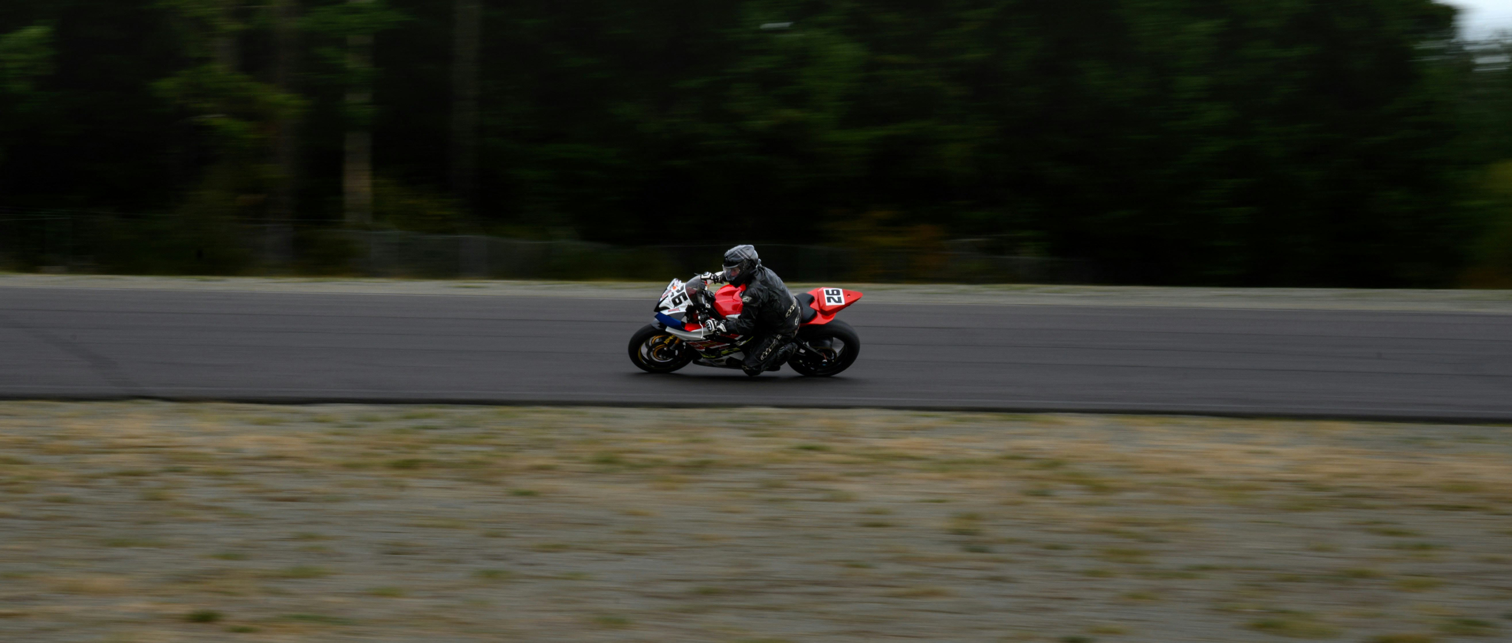 Rider in Focus: A Sprint on the Edge of the Track