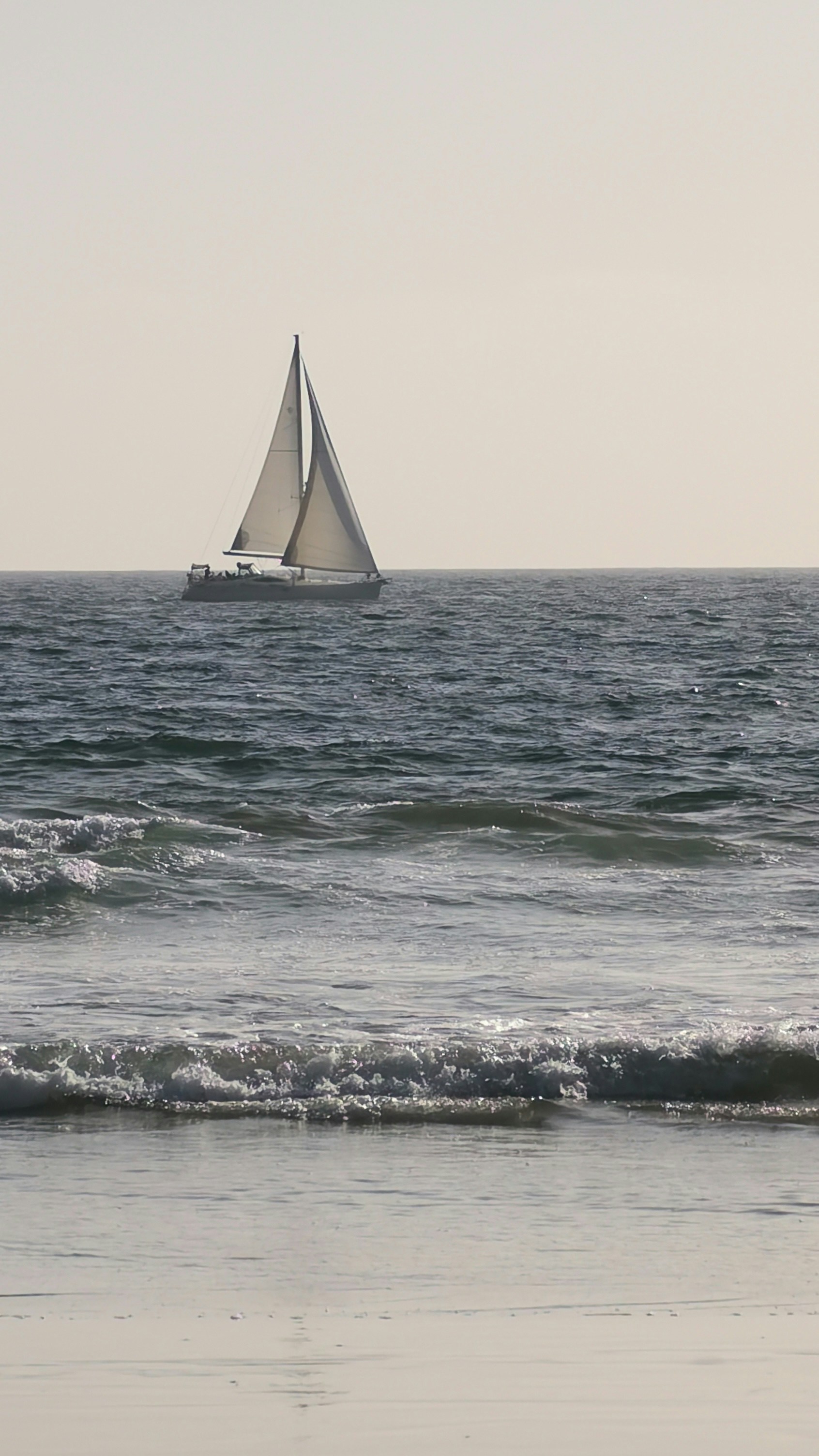 Sailboat Crossing Quiet Atlantic Light