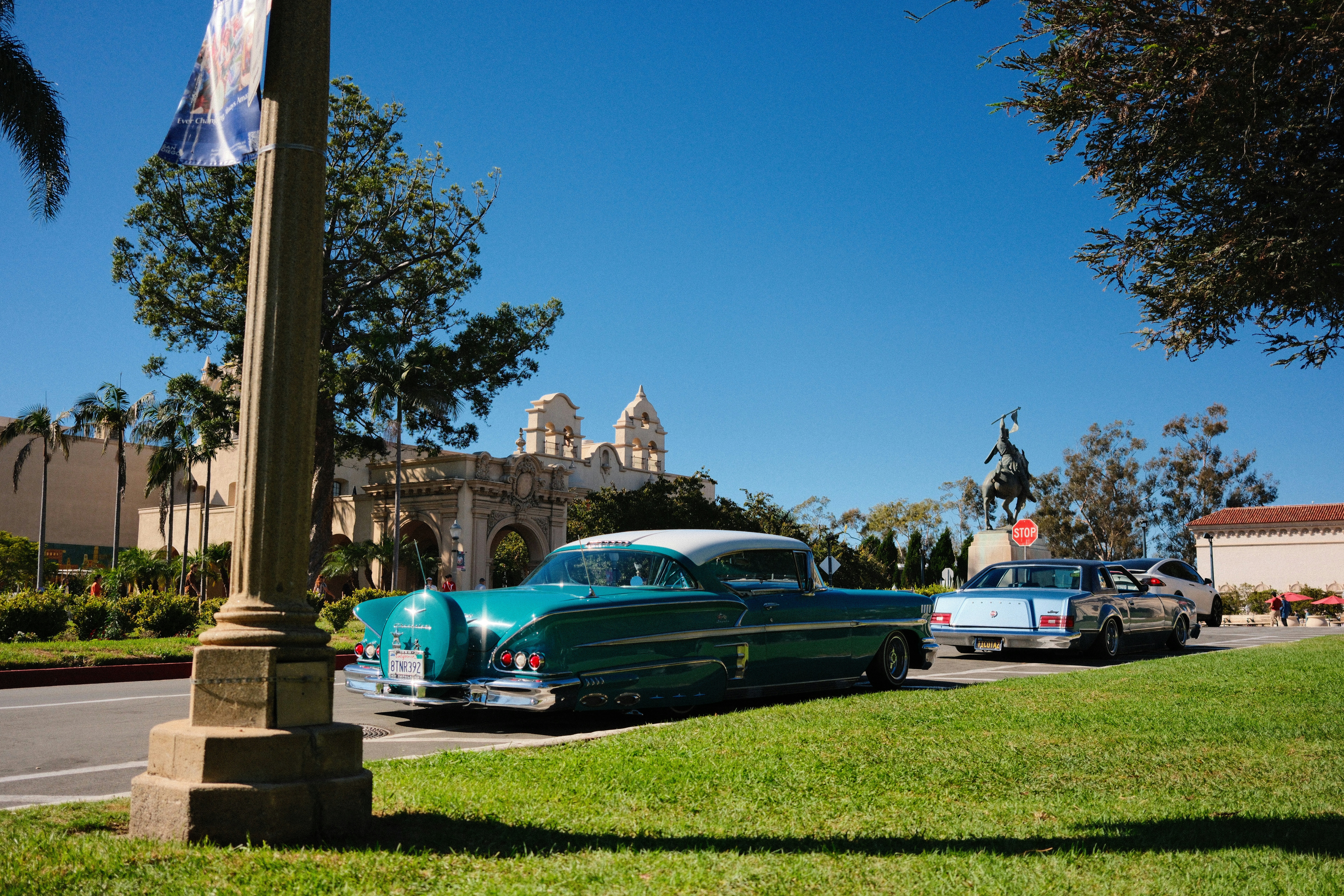 Pastel Cadillac on a sunlit street