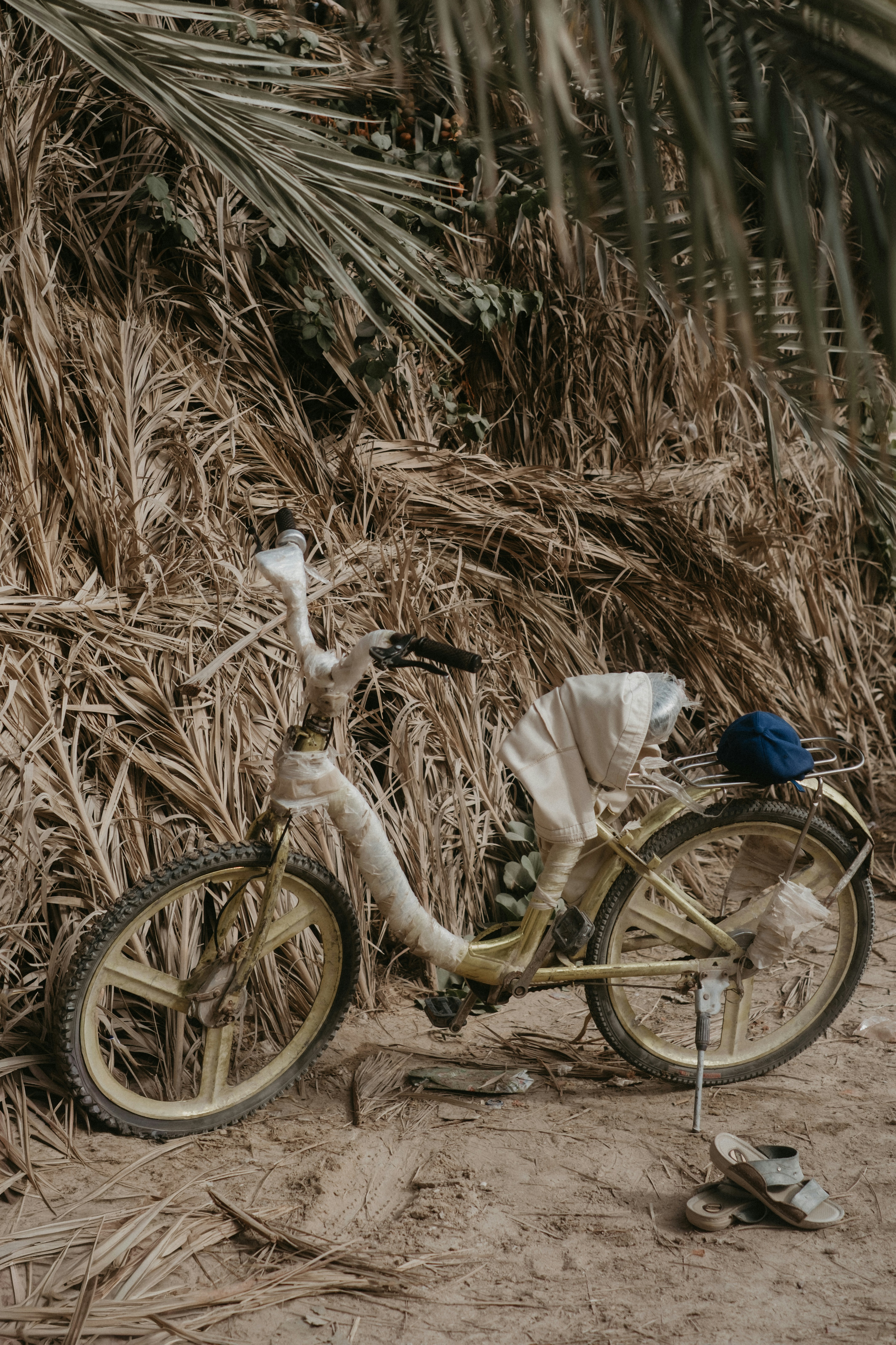 Worn Yellow Bicycle in a Dry Gorse Corridor