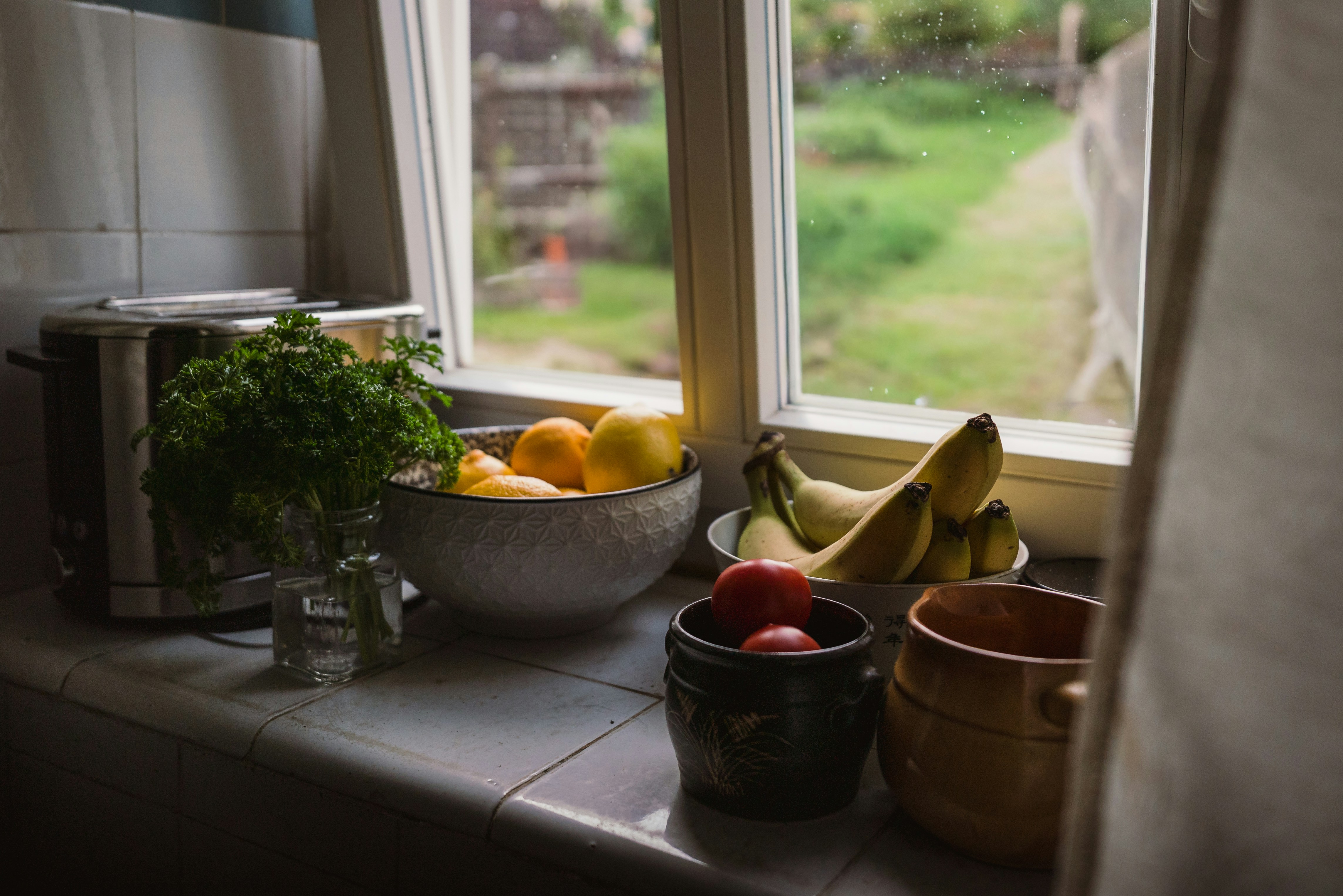 Sunlit Windowsill Still Life with Fruit and Herbs