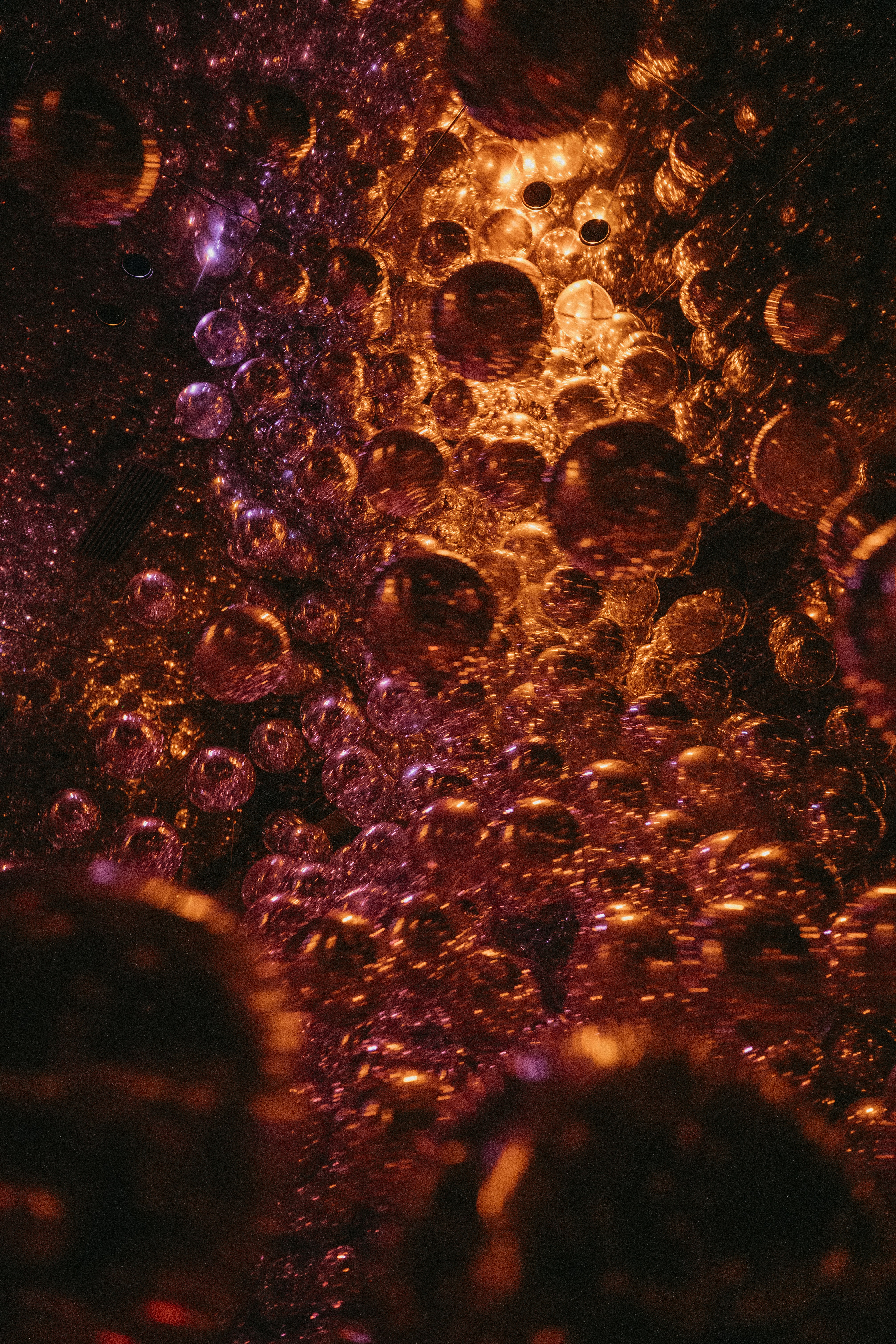 Fiery Orbs in a Steam of Bubbles