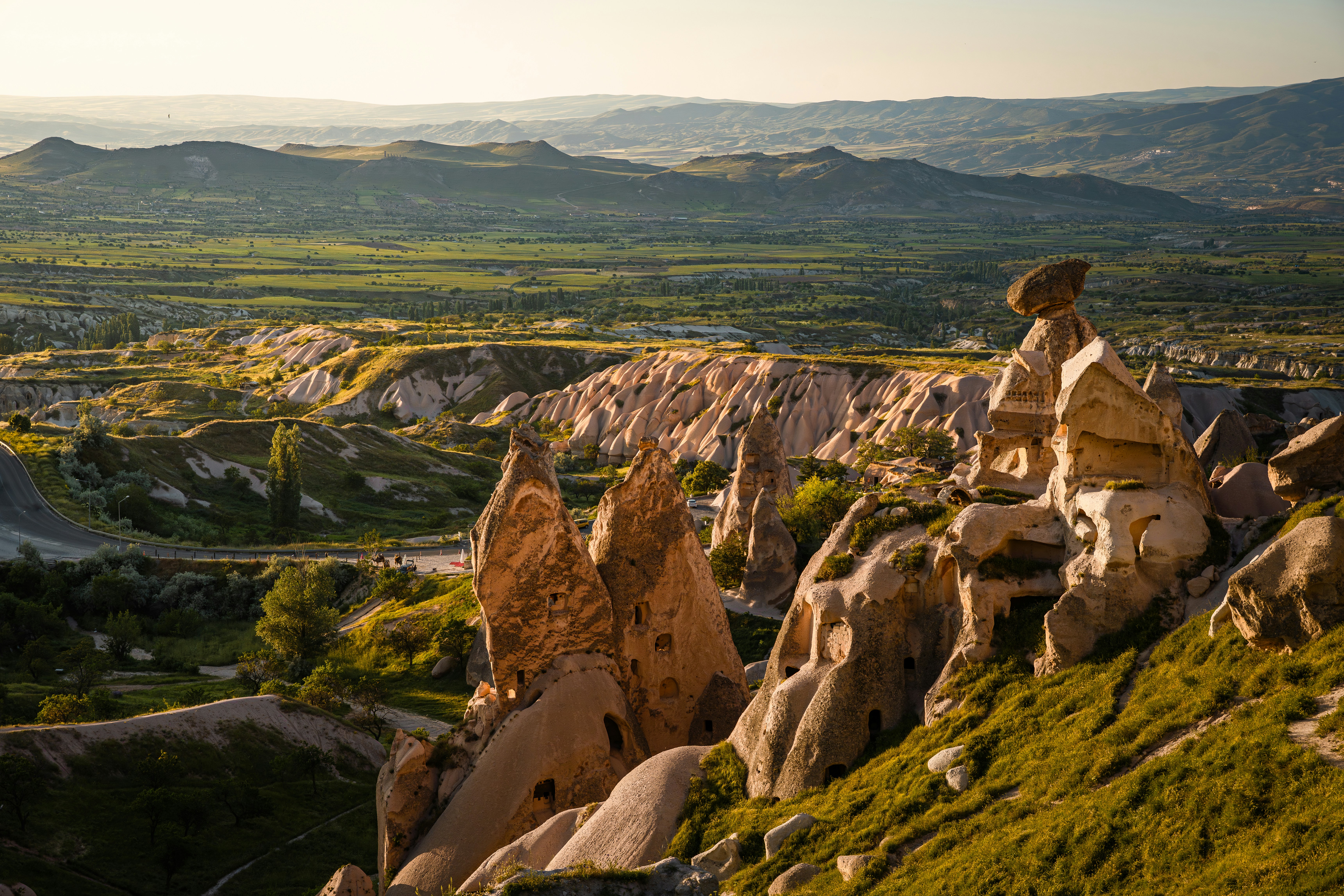 Stone Choir of Cappadocia: Erosion-shaped spires under warm afternoon light