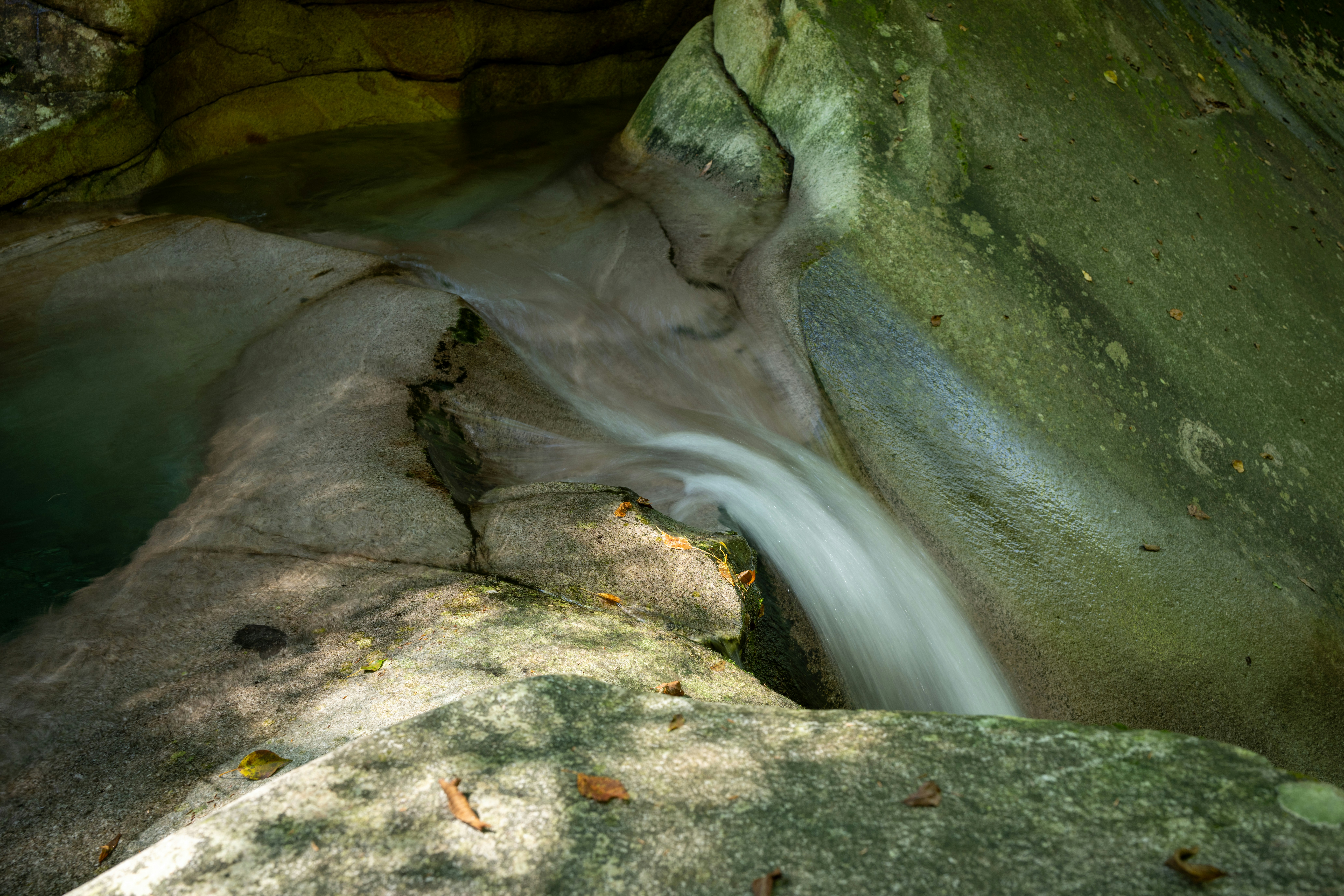 Whispering Canyon: Smooth Water Carving Through Granite