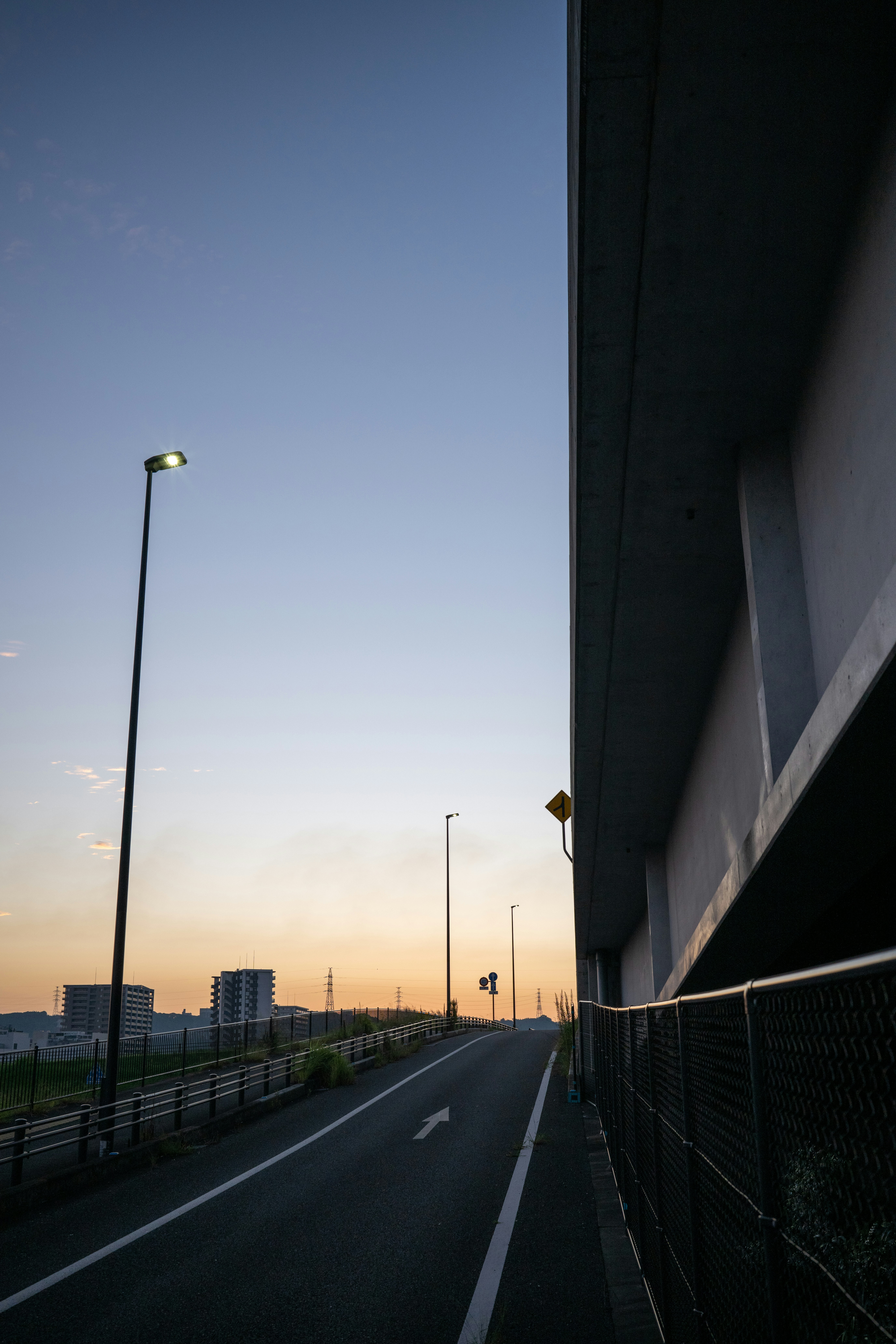 Sunset Overpass: A Quiet Ascent Toward the City