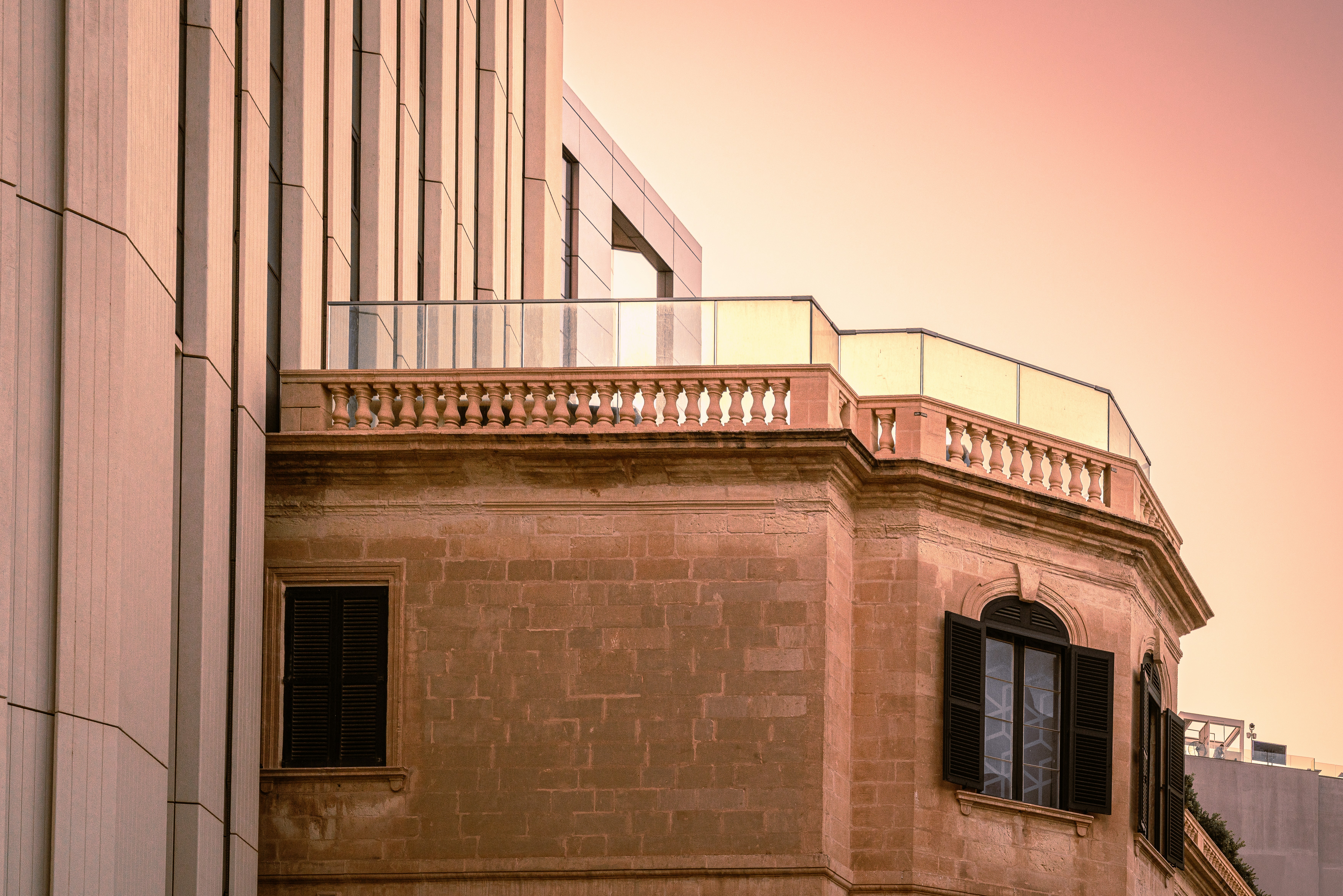 Sunlit Terrace: Corner of Stone and Glass
