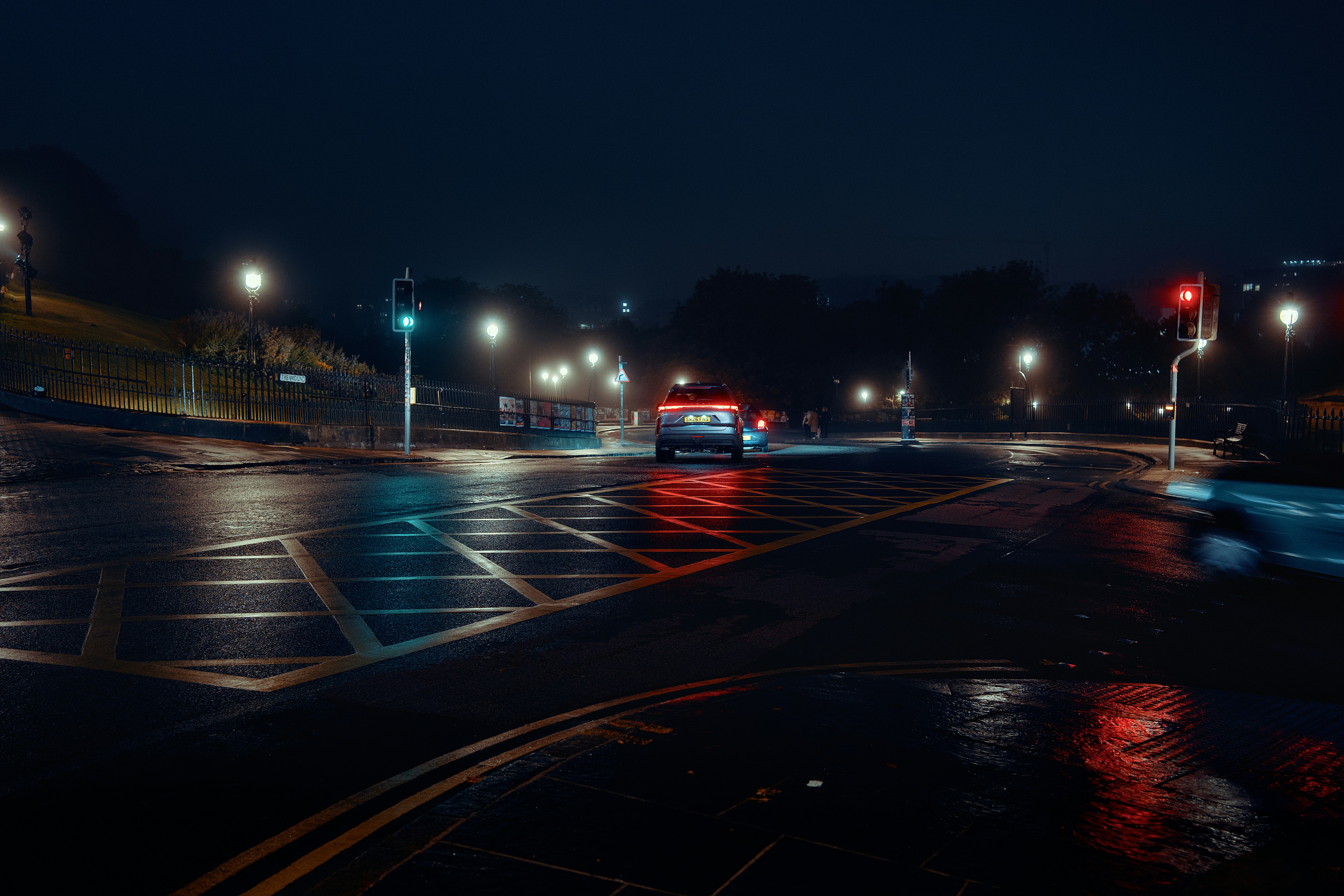 Midnight Crossroads: A Neon Bath on Wet Asphalt