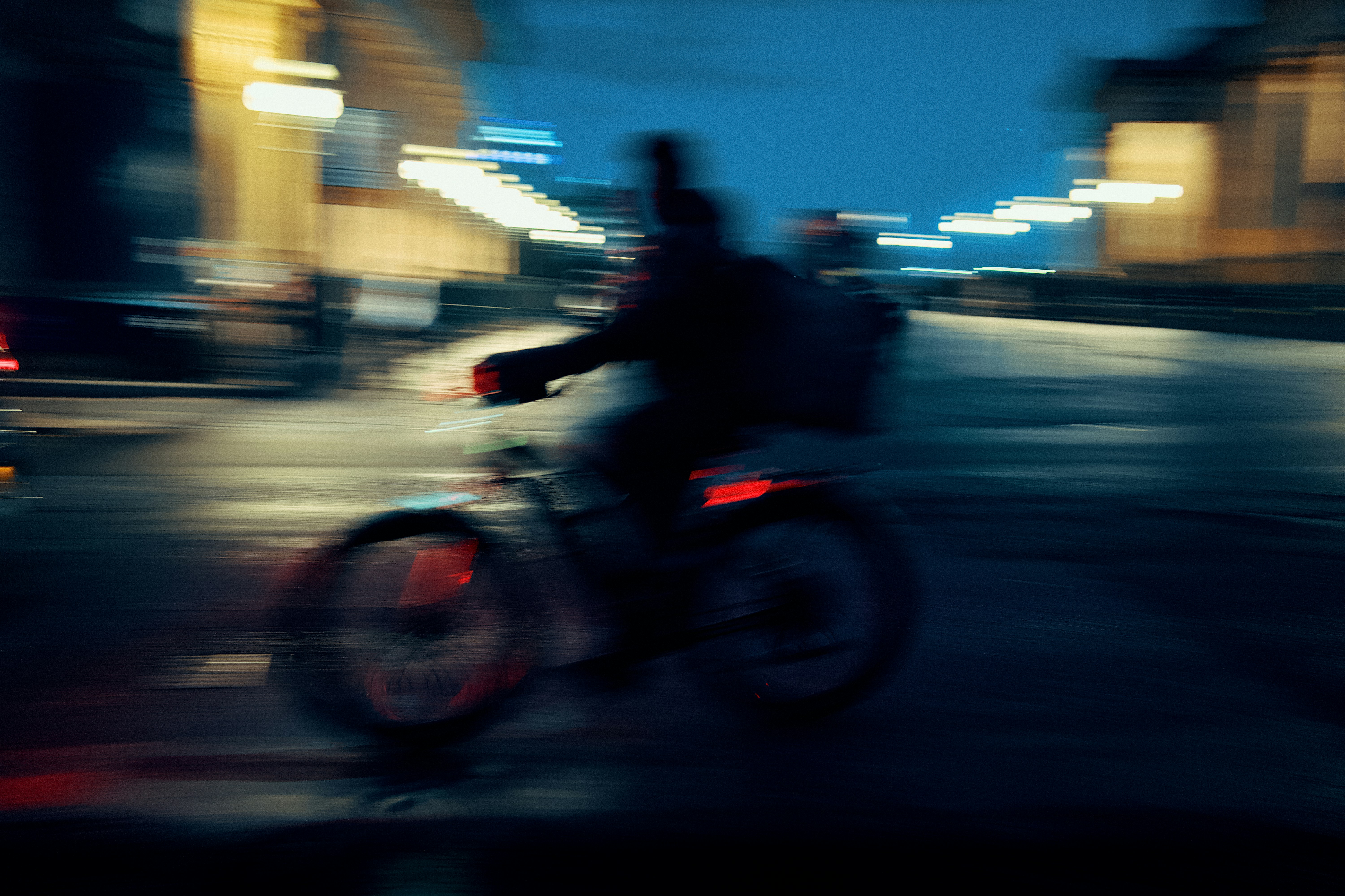 Night Ride in Blur: A Scooter Slice Through Neon Streets