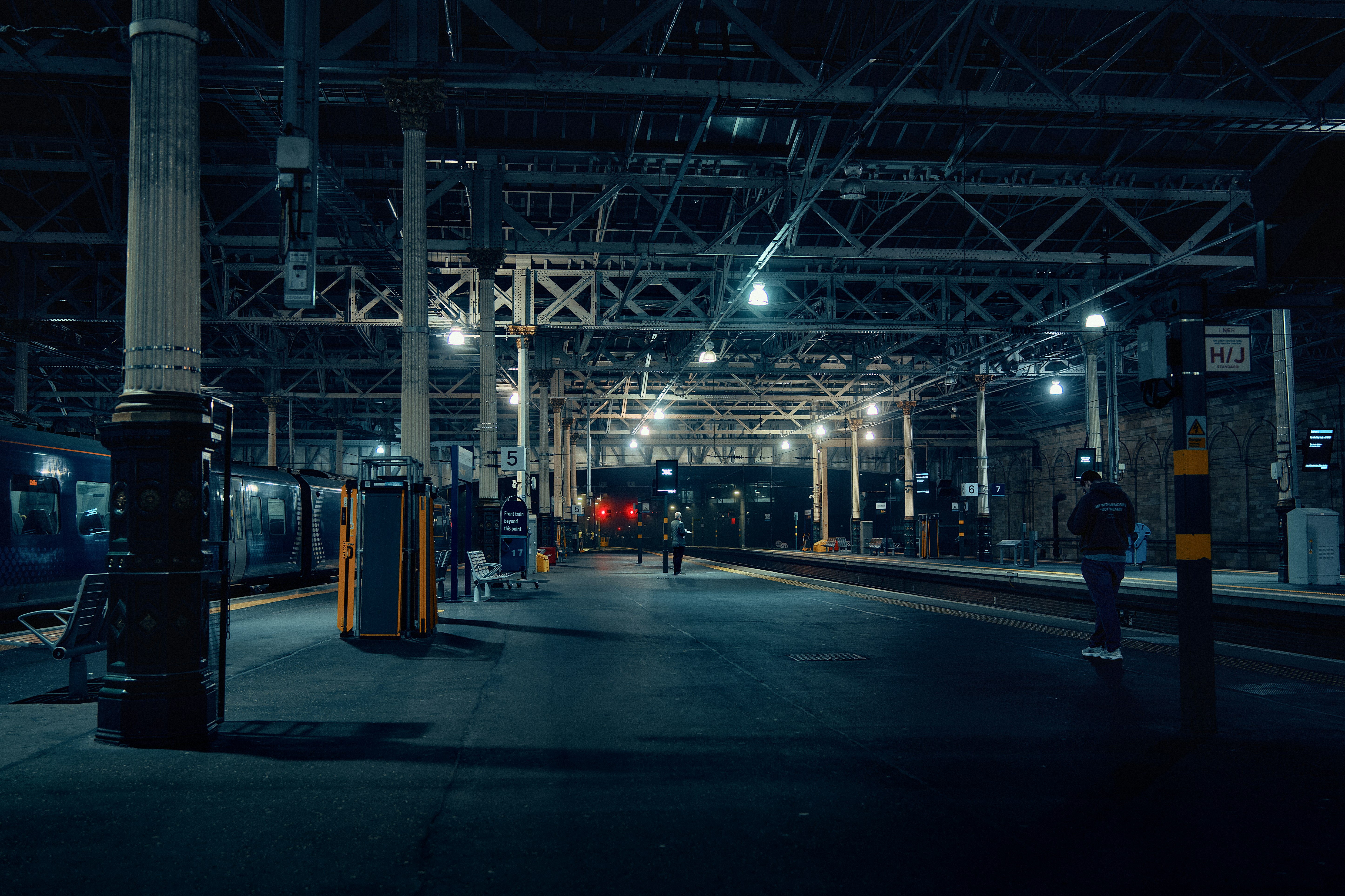 Vacant Platform (Blue Hour) Beneath Steel Trusses
