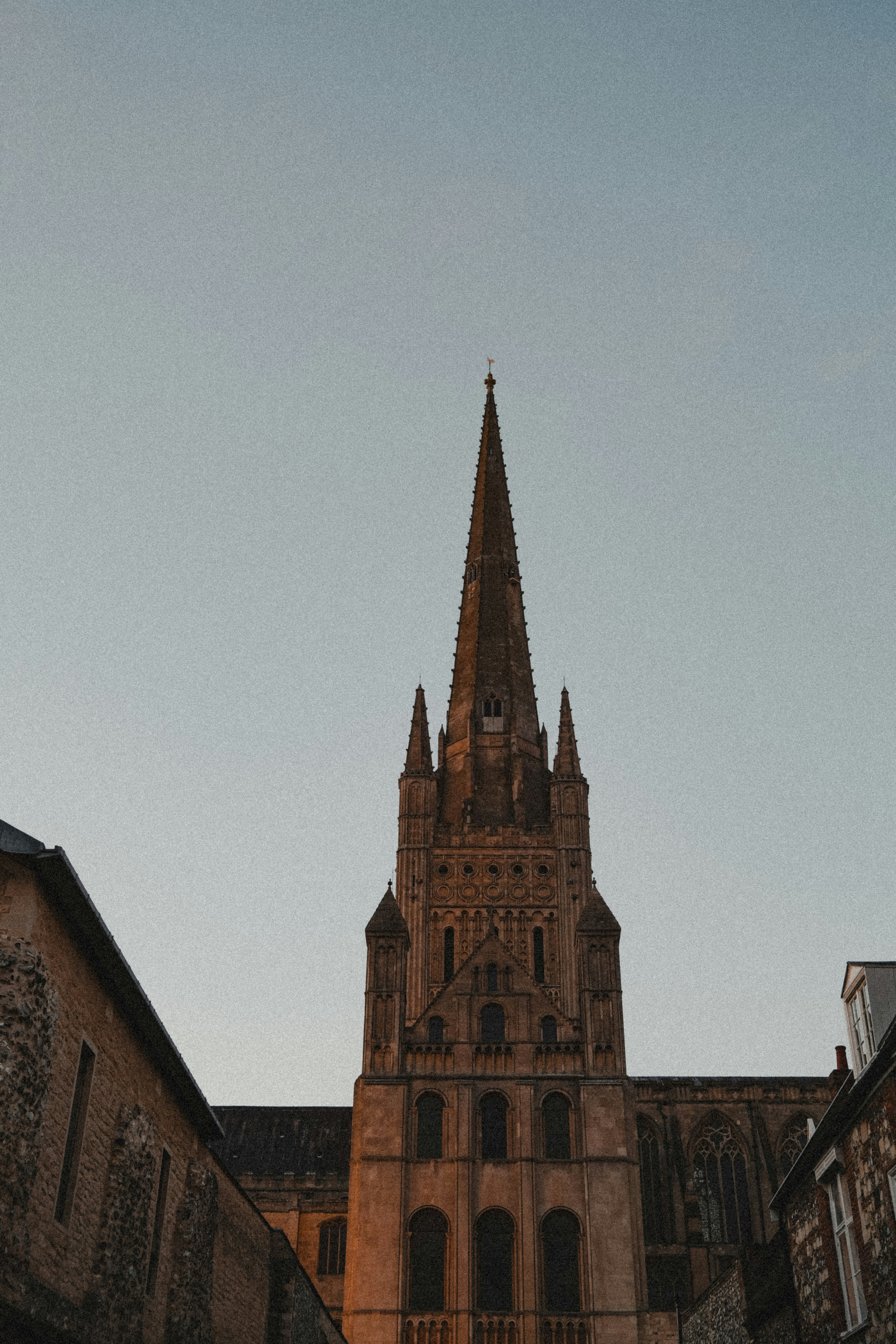 Gothic Bell Tower Reaching Toward a Pale Sky