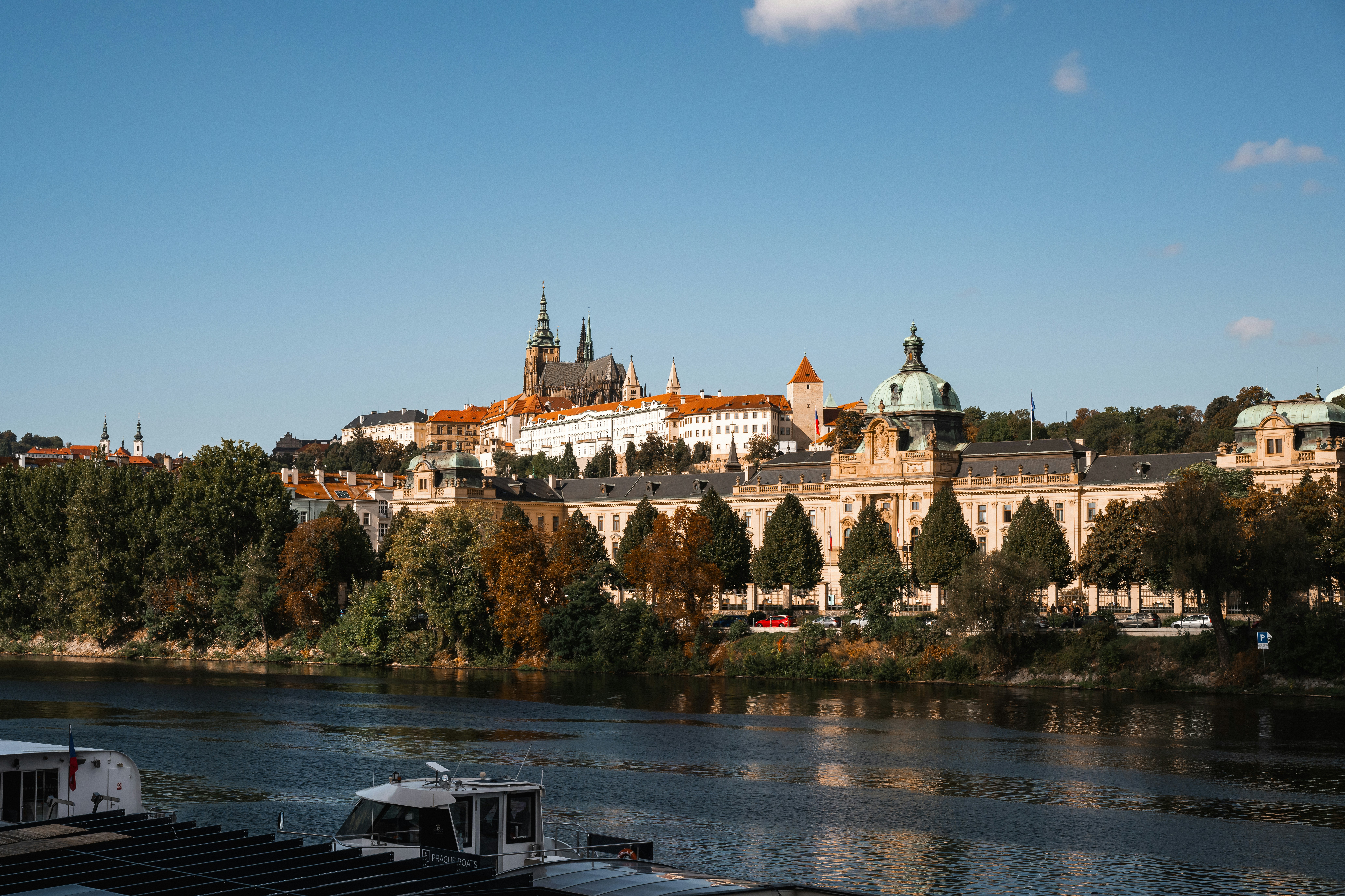 Riverside Fortress: Cathedral Silhouettes Above a Calm Danube