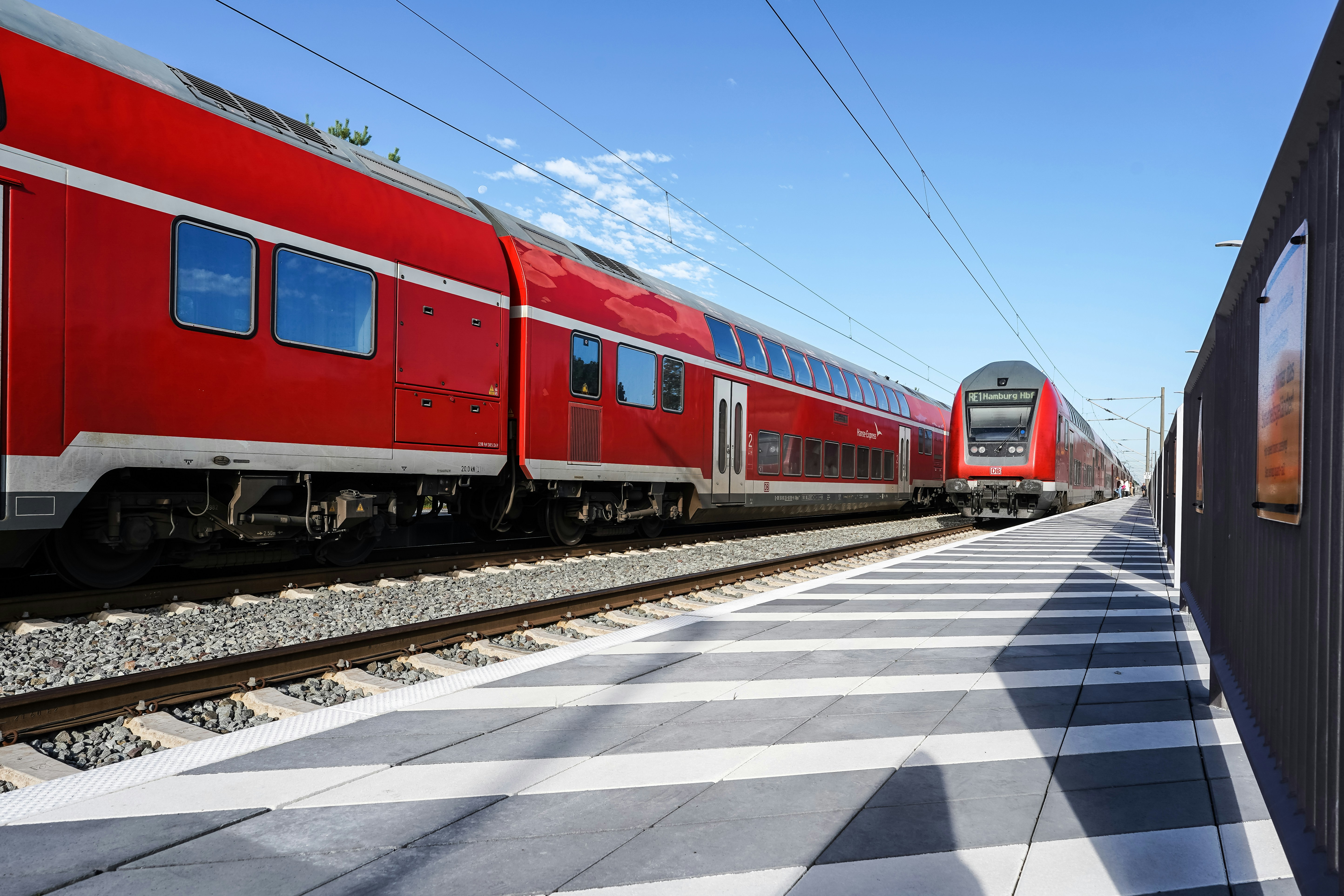 Red Intercity at Platform Edge: A Quiet Moment Before Departure