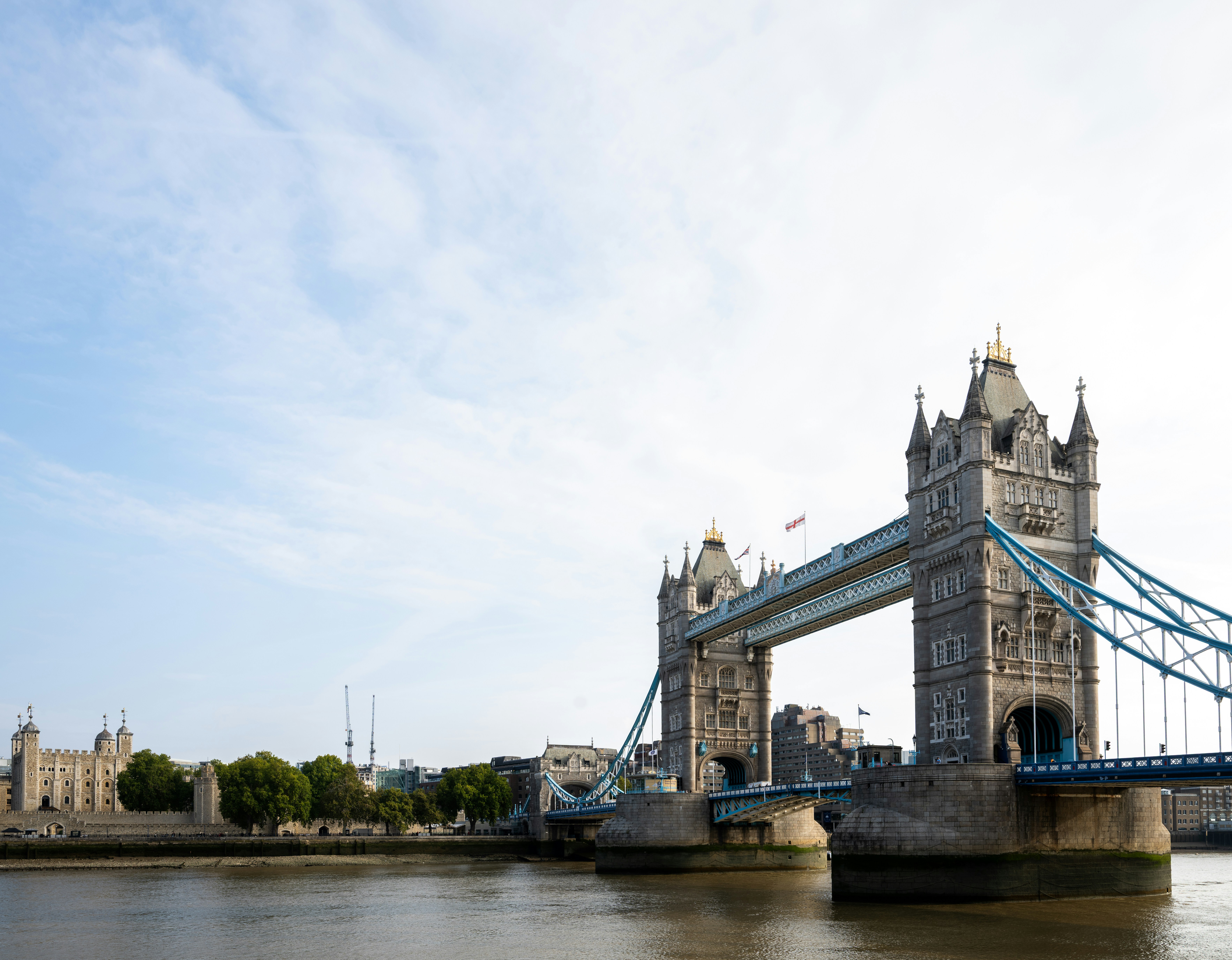 Tower Bridge at Dusk: River Thames Framed by Gentle Sky and Historic Silhouettes