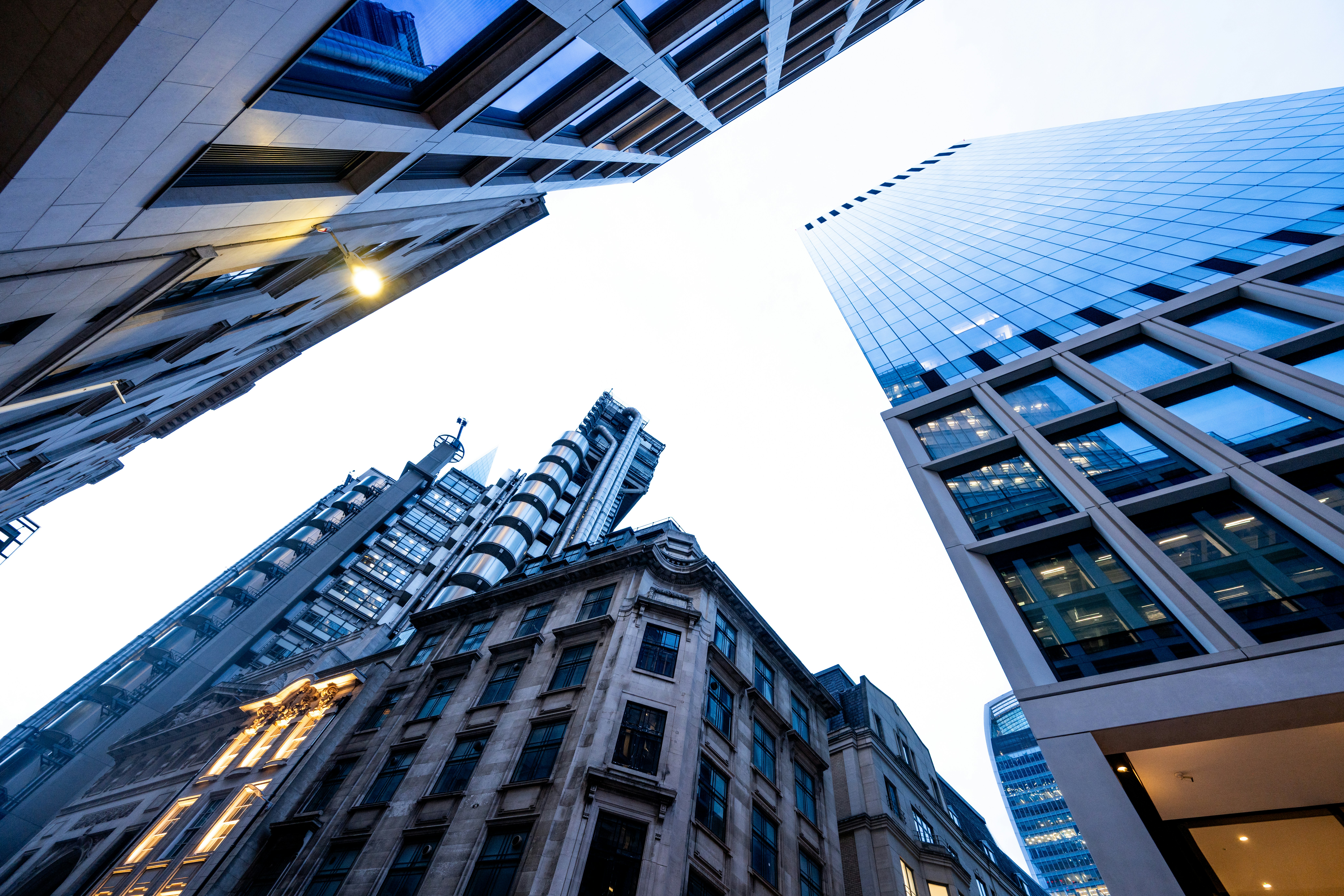 A Skyward Confluence: City Towers Lean into the Overcast Light