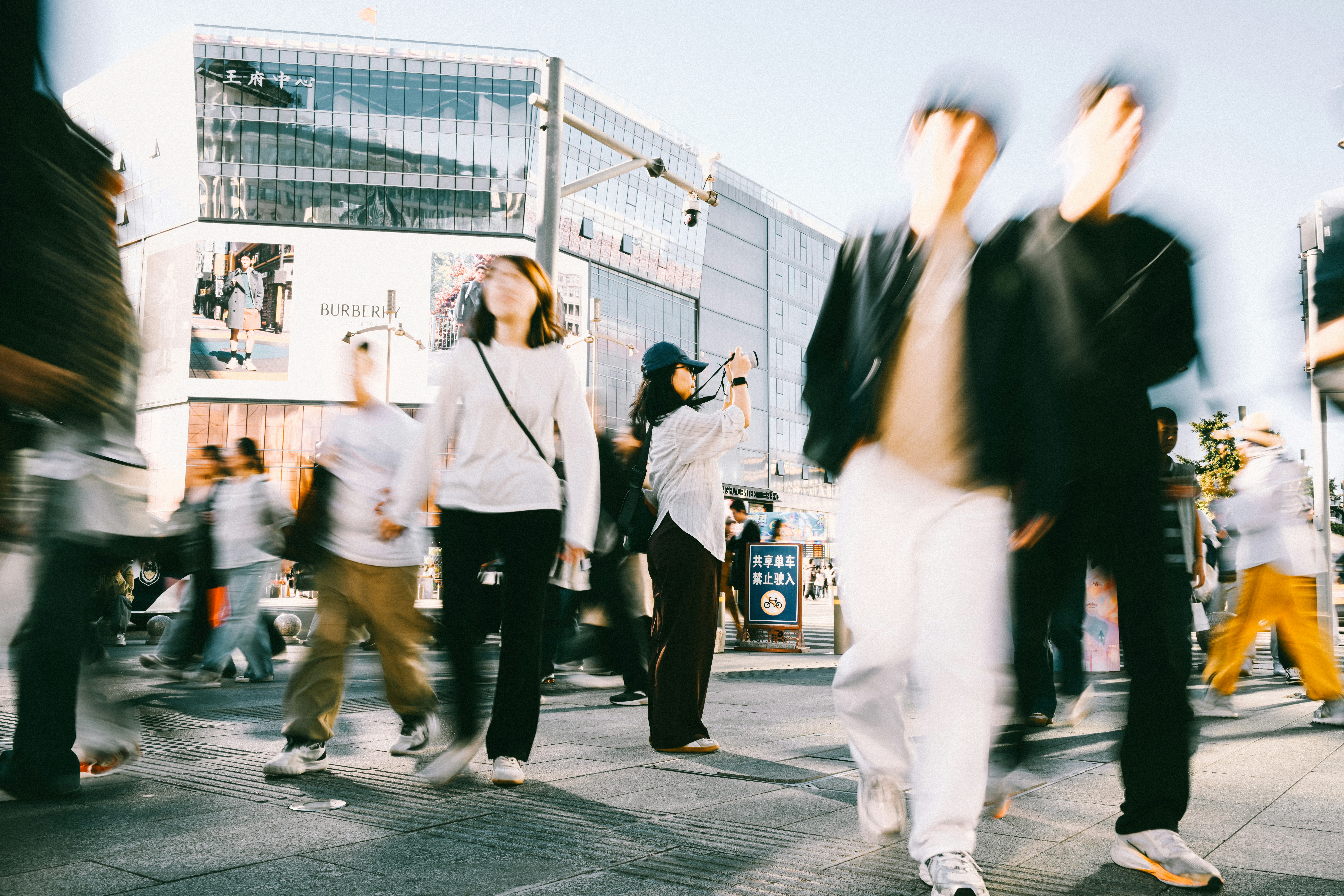 Blurred Pedestrian Pulse at a Modern Transit Hub