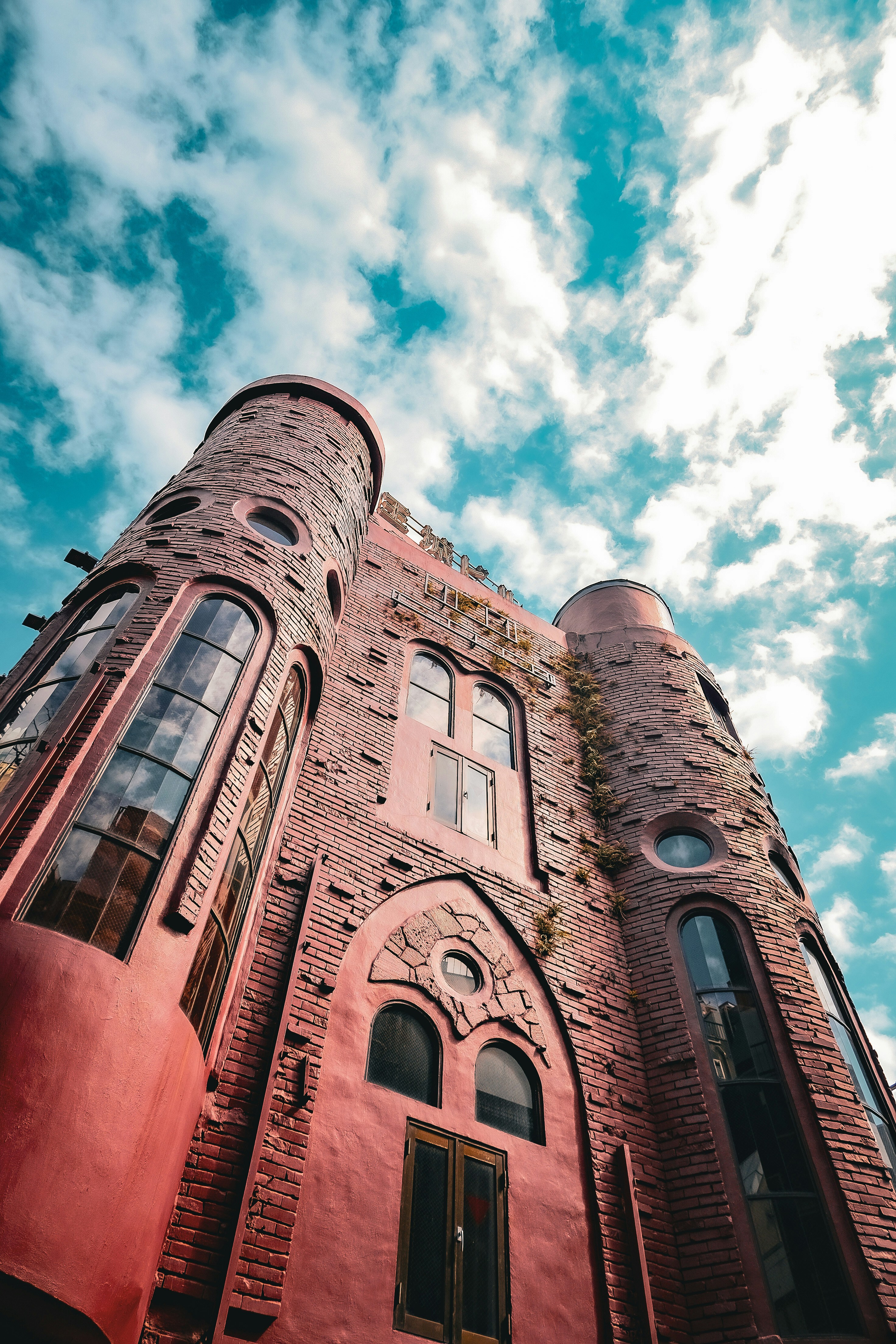 Castellated Brickwork Reaching Toward a Cerulean Sky