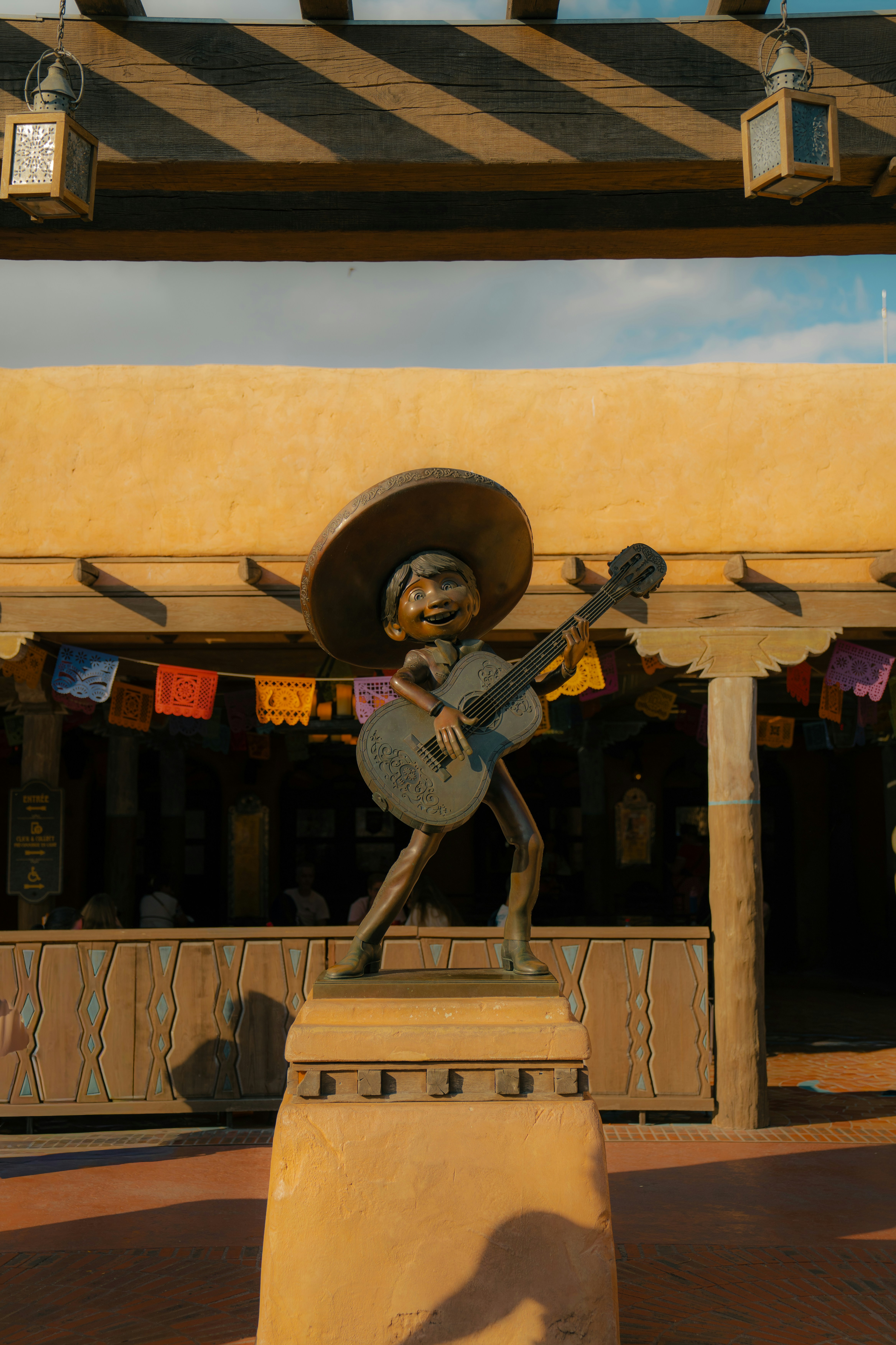 Gaucho with Guitar: A bronze serenade under warm adobe light