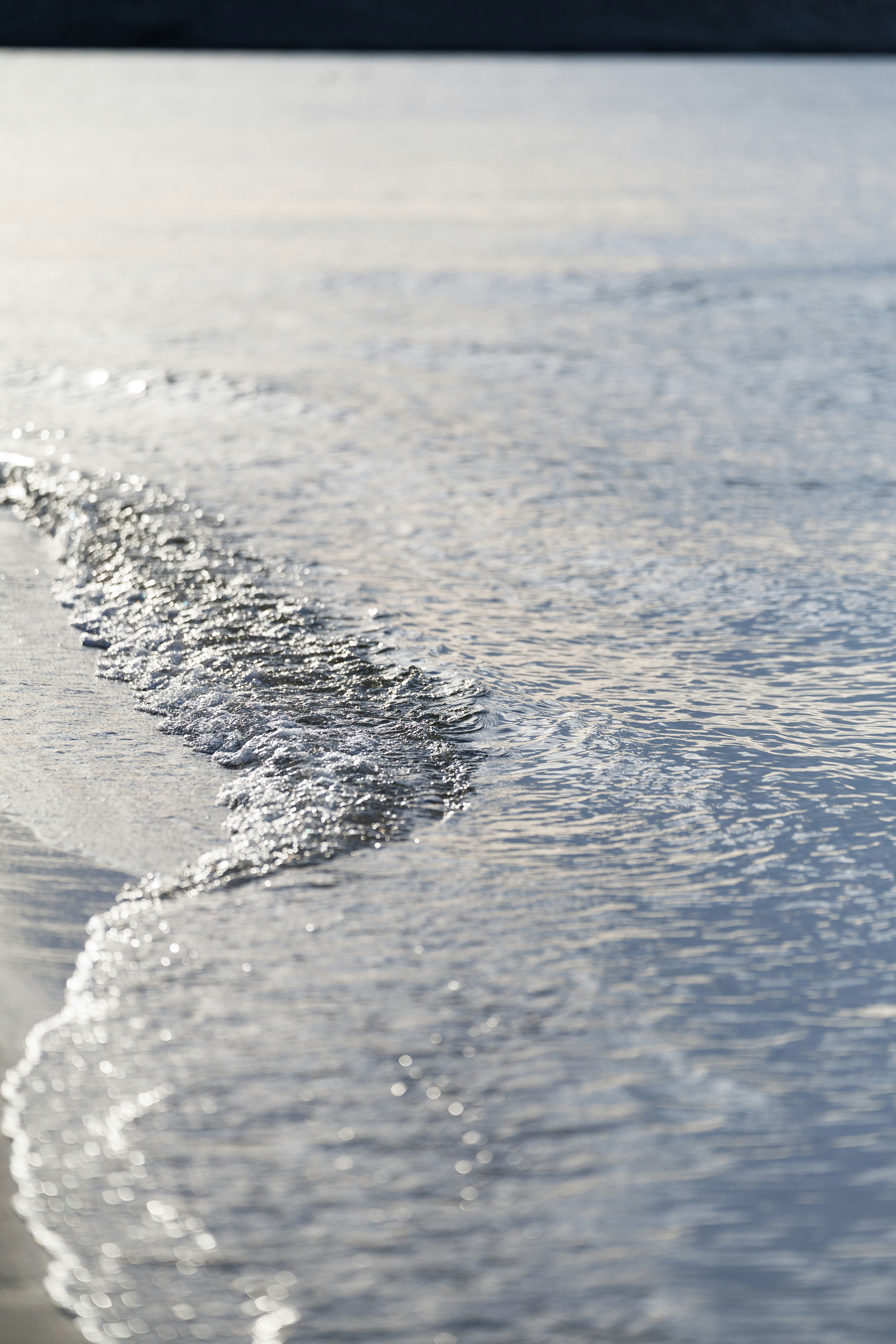 Soft Tide Tracings: Gentle Shoreline Curves at Dusk