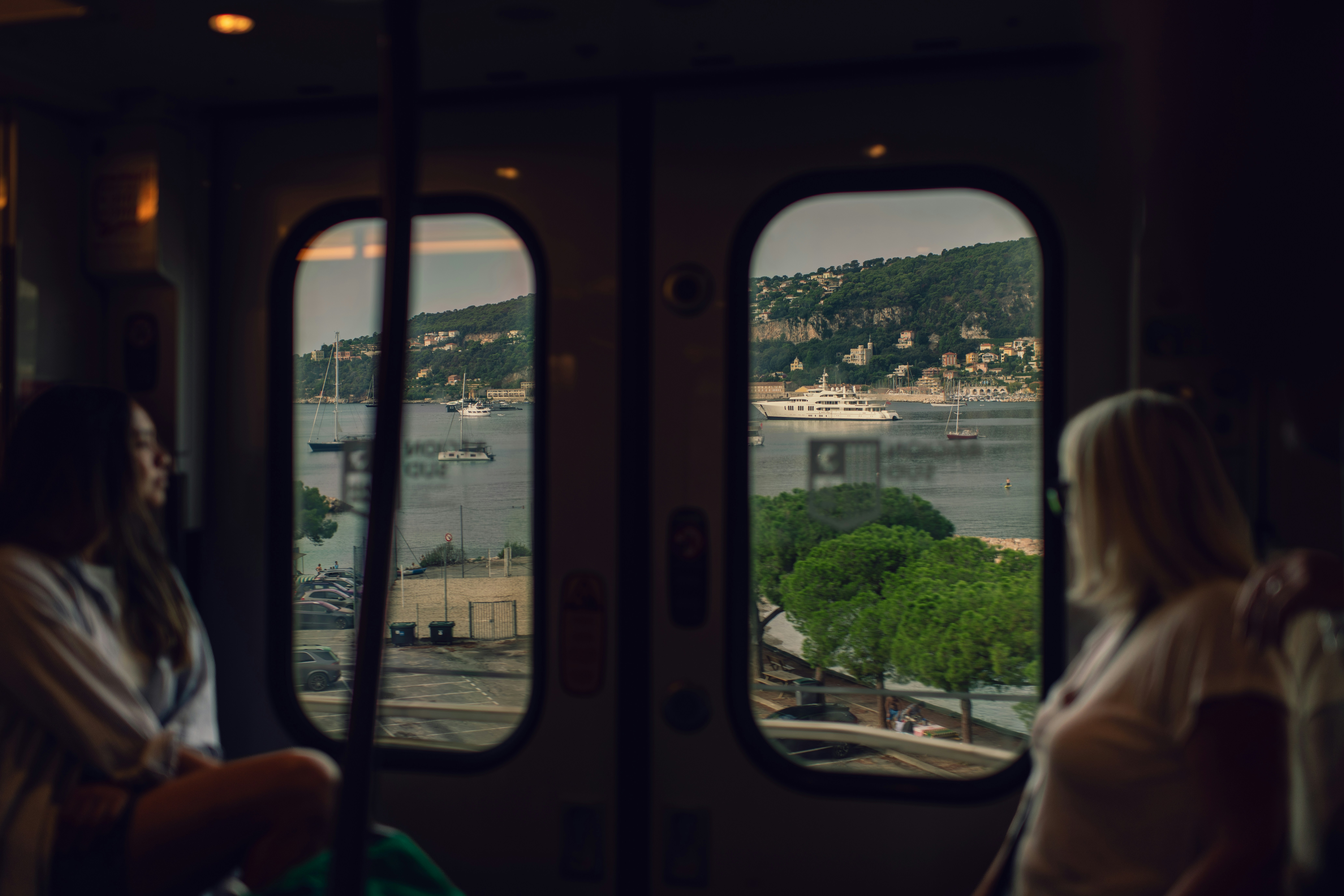 Windowed Transit: Cityscape Beyond Two Cabins