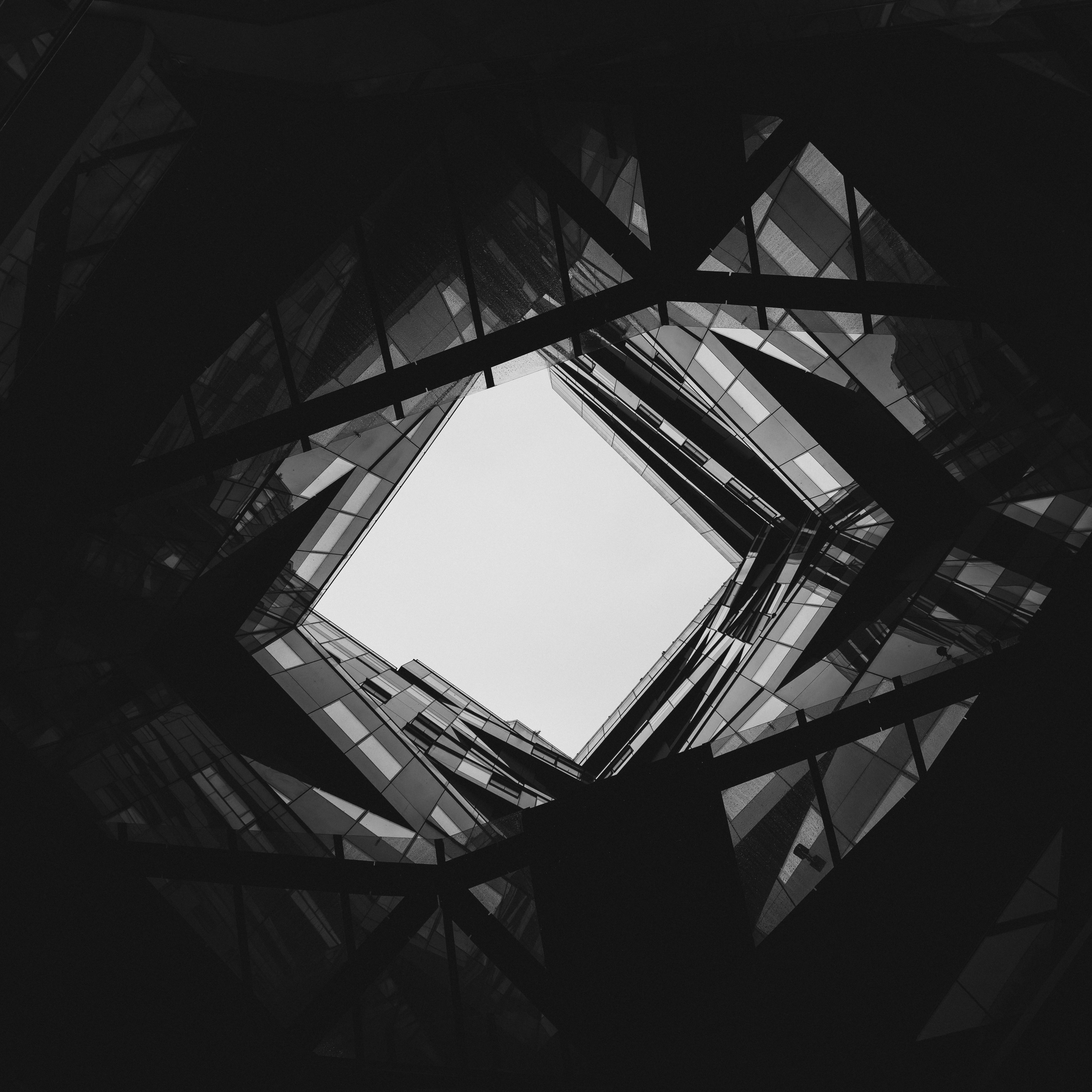 Open Sky Within Steel Veins: A Geometric Atrium View