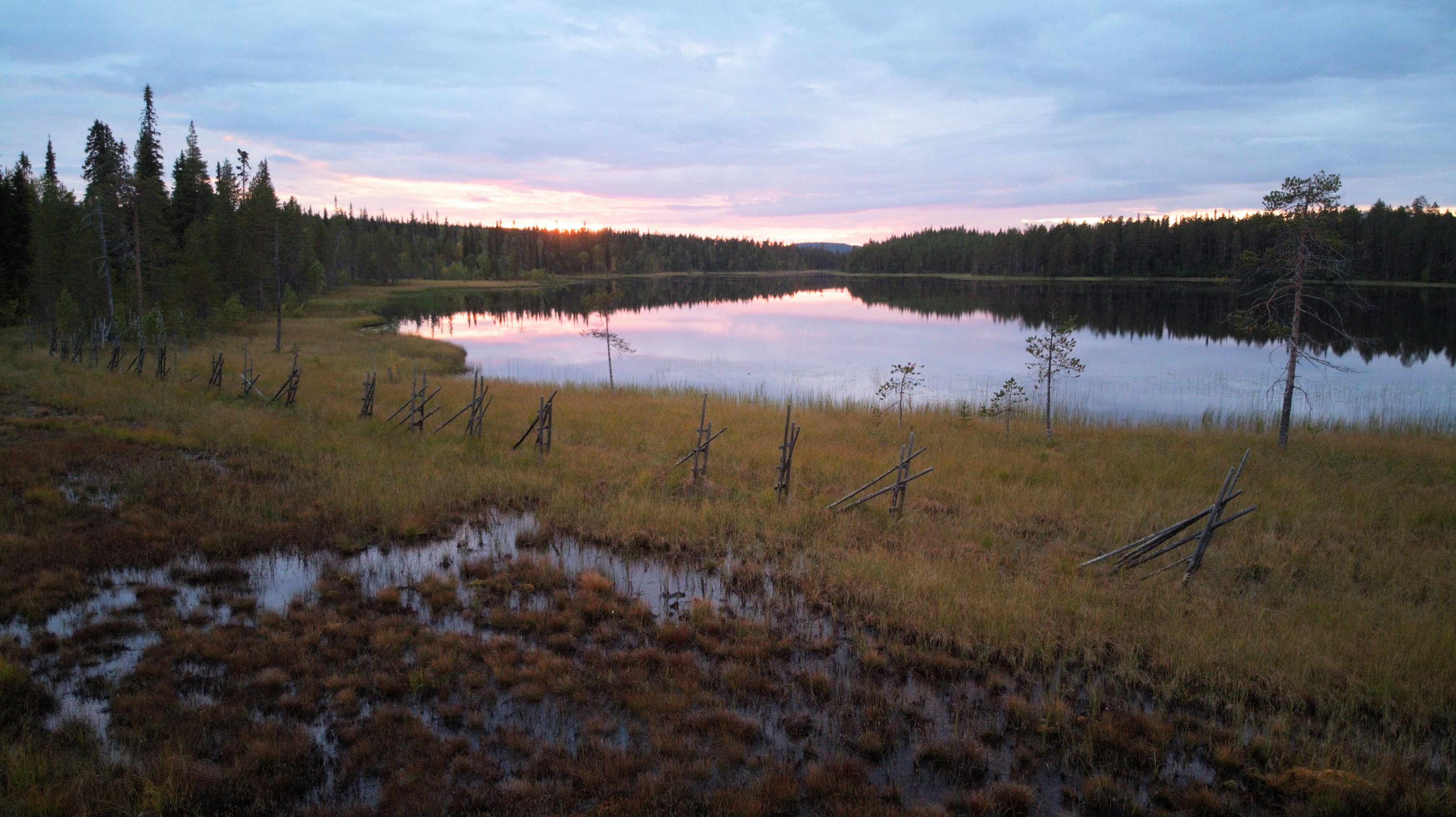 Twilight Tundra: A Quiet Bend of Water at Dusk