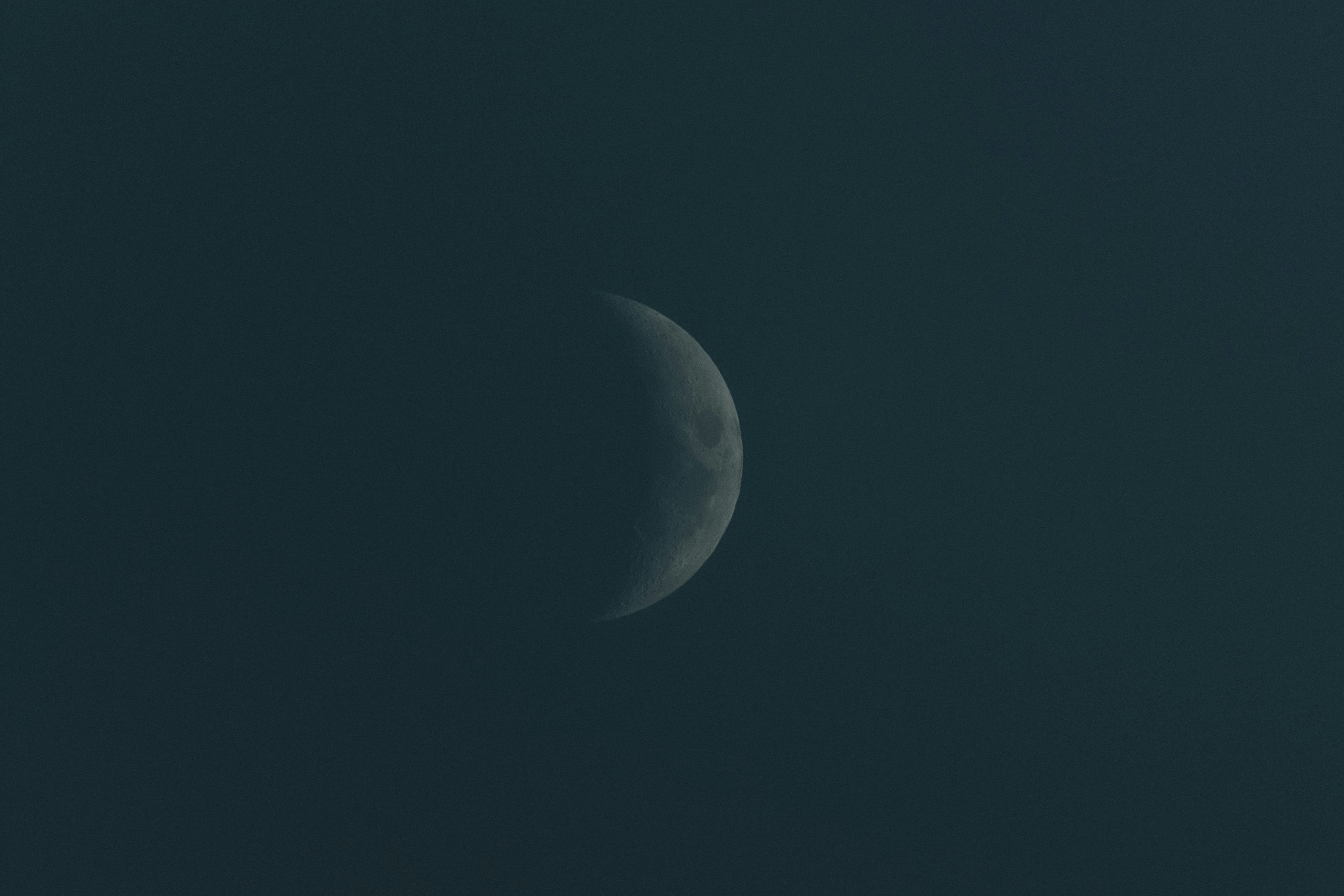 Luminous Crescent: Moon Veil in Quiet Night
