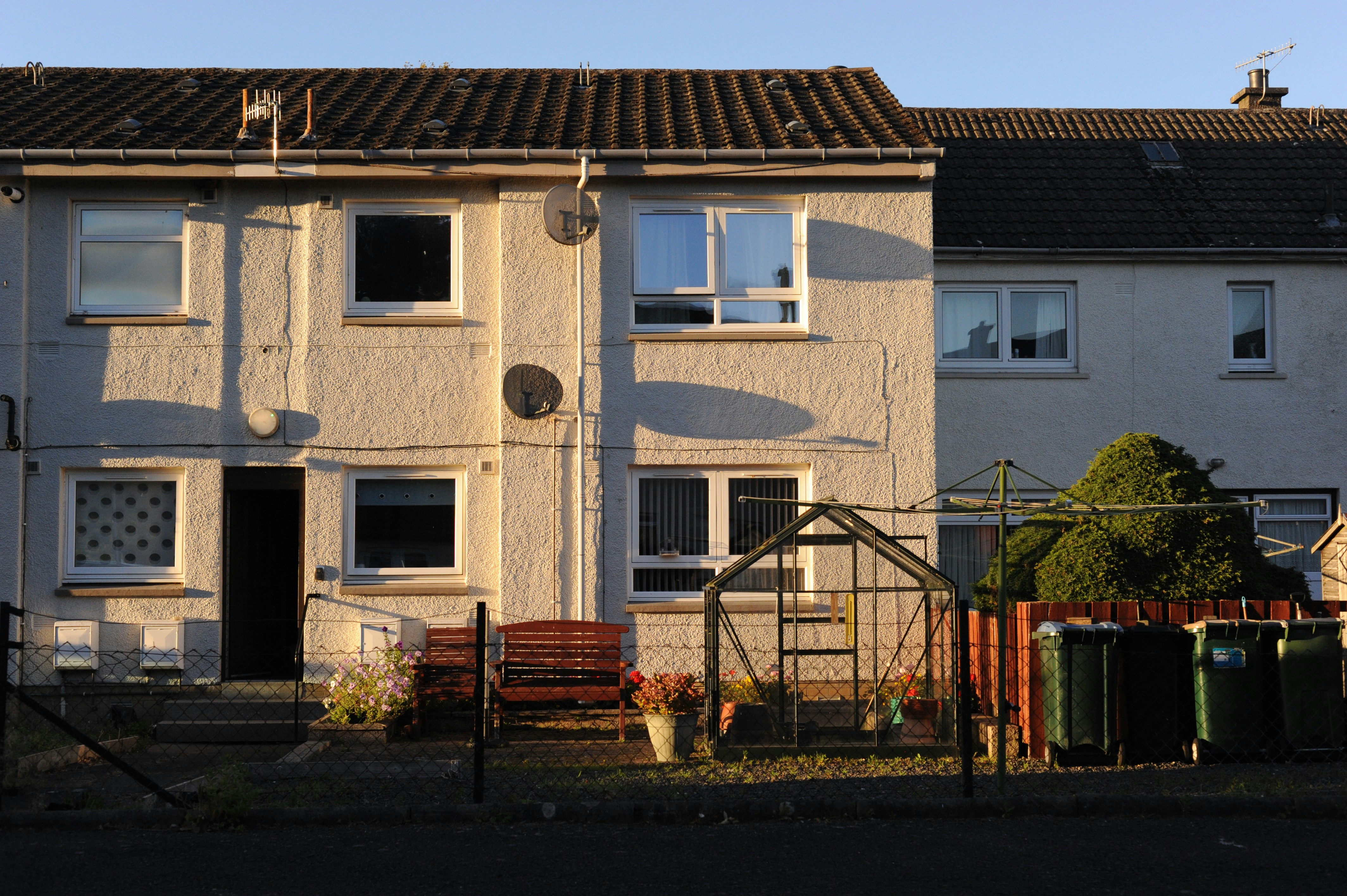 Front Terrace Echo: A Quiet Suburban Facade at Dusk